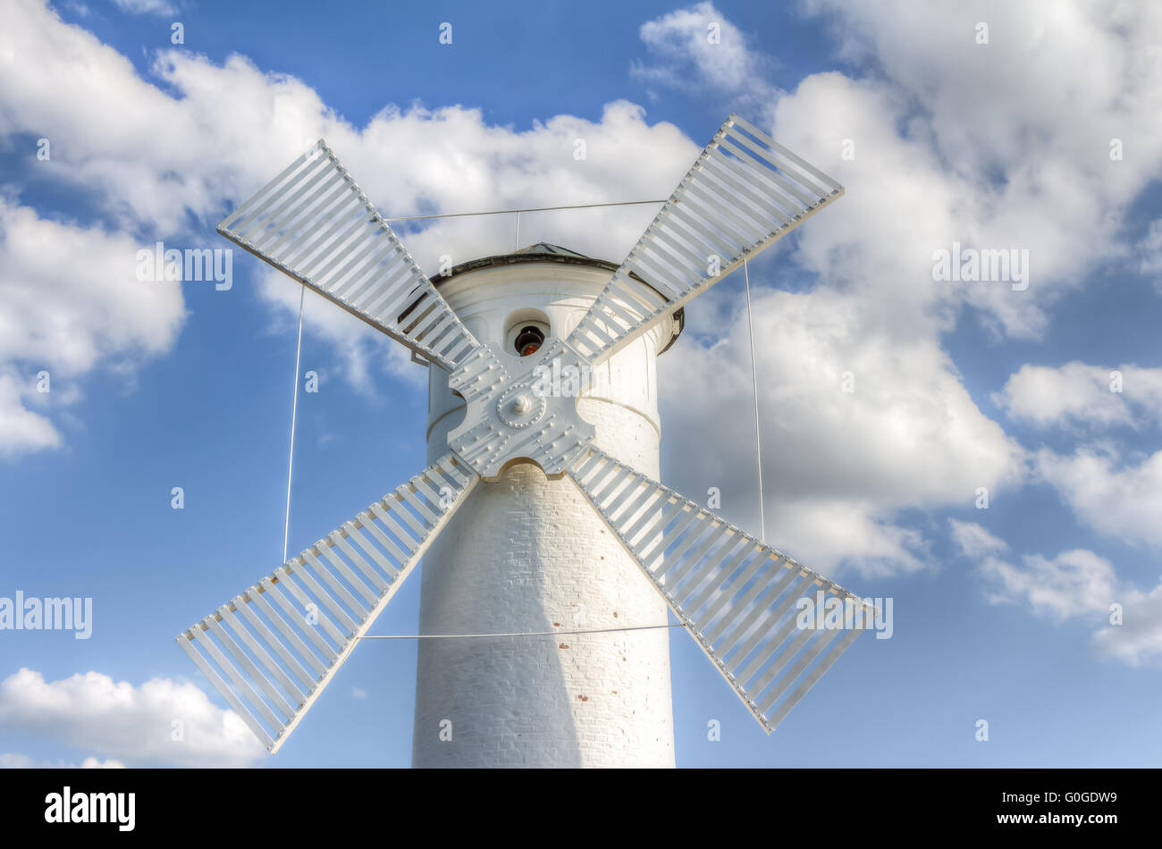 Lighthouse windmill in Swinoujscie Stock Photo - Alamy