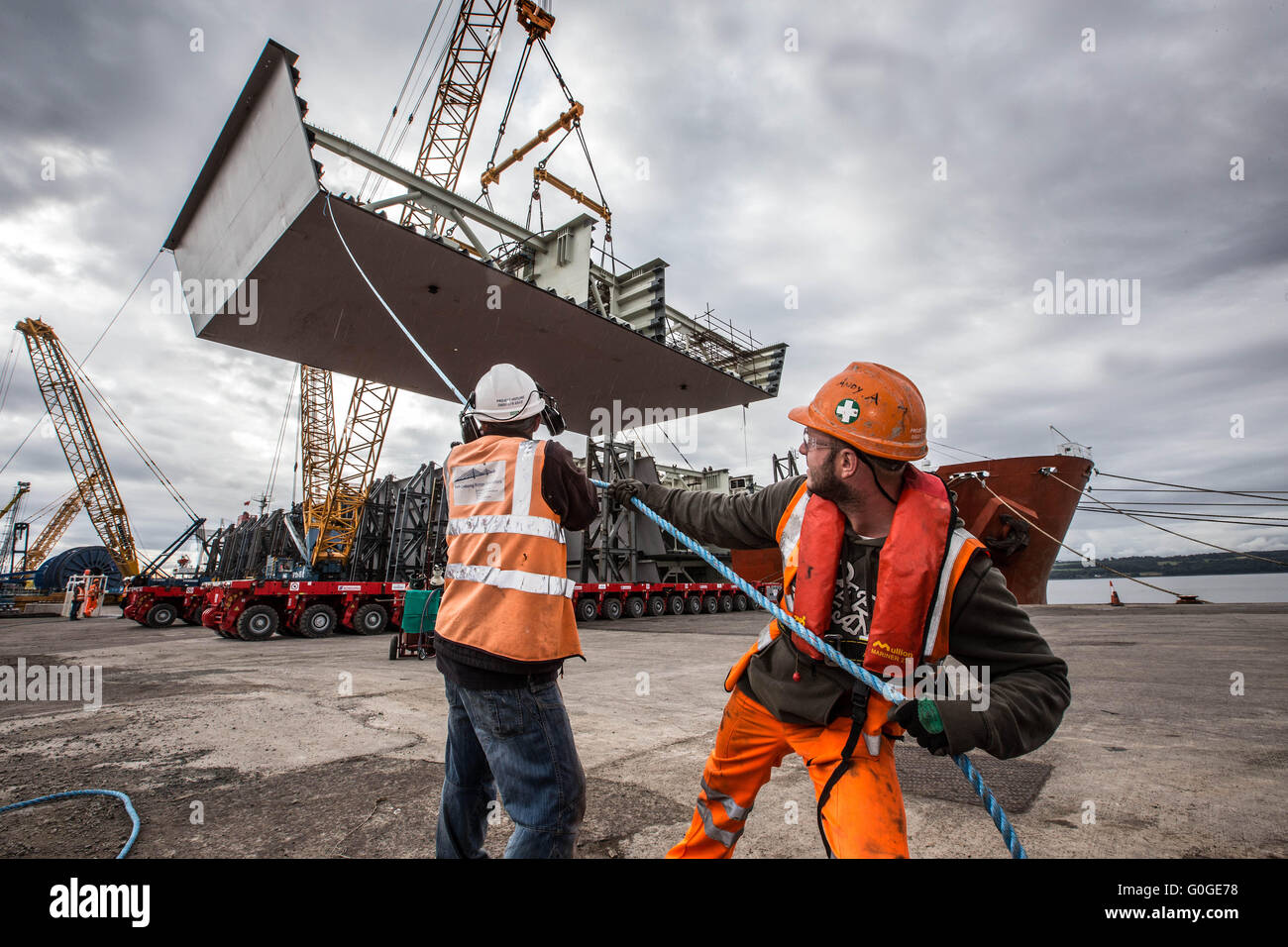 Tanker being unloaded of cargo Stock Photo - Alamy