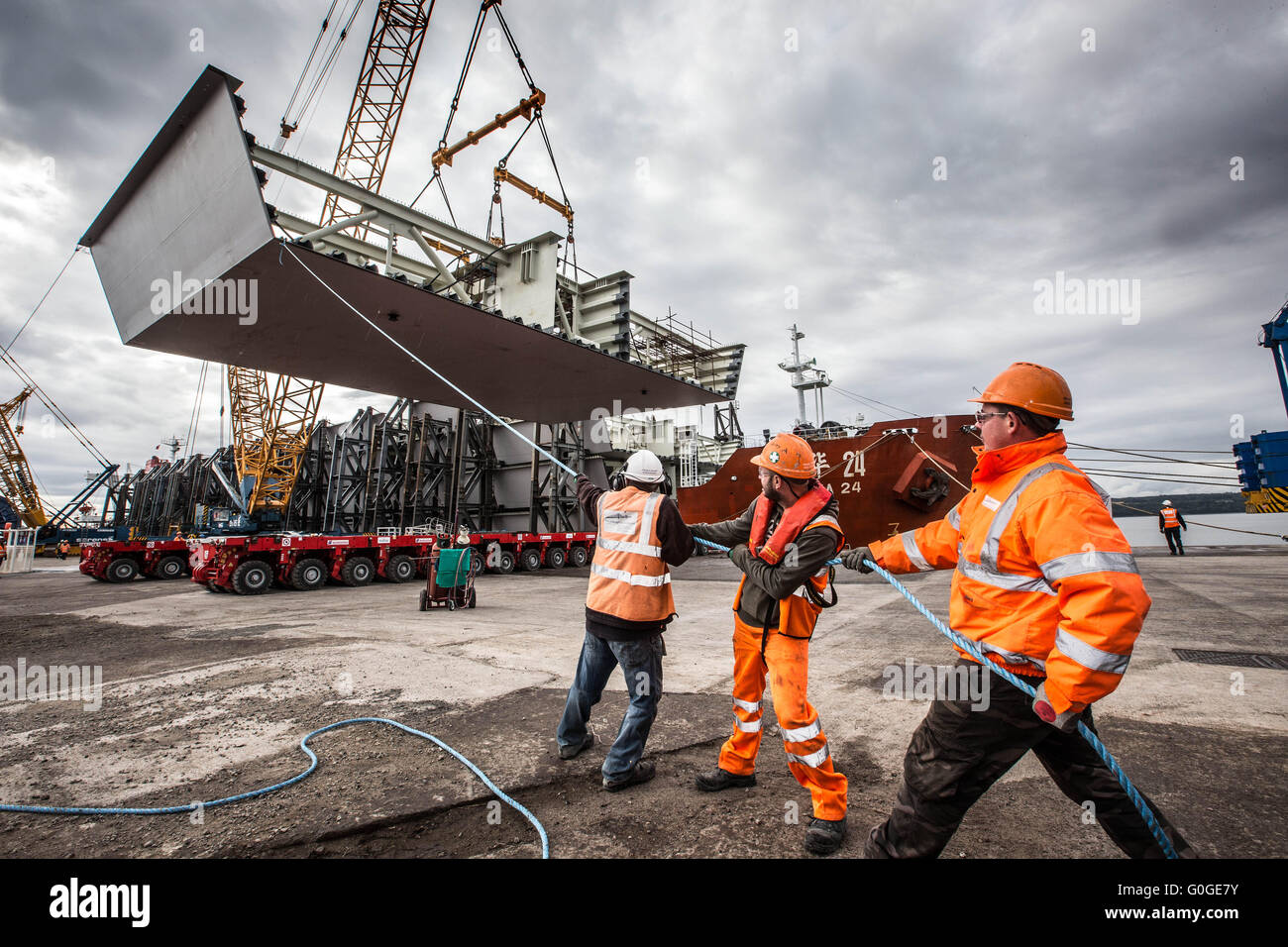 Tanker being unloaded of cargo Stock Photo - Alamy