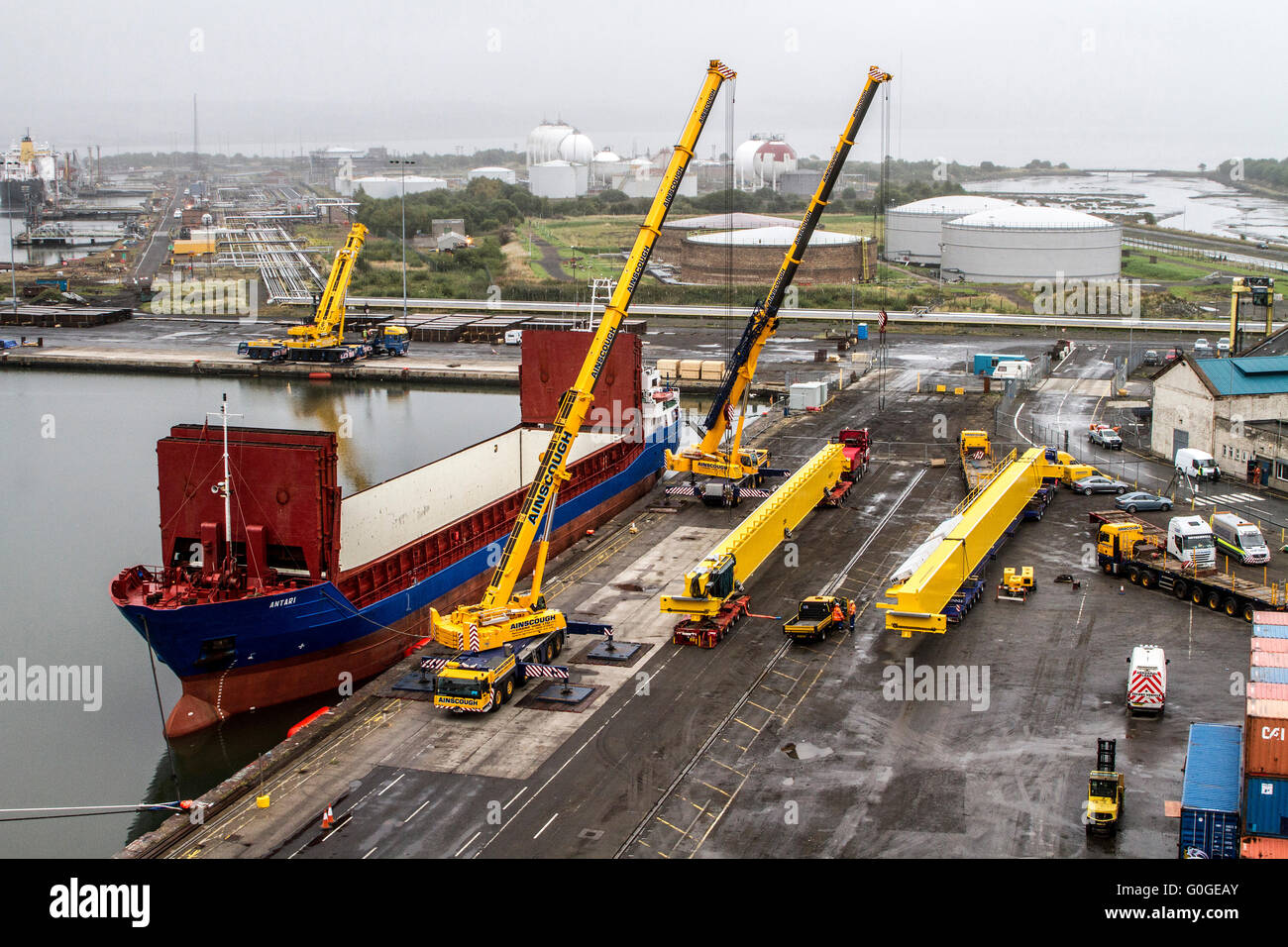 Tanker being unloaded of cargo Stock Photo - Alamy