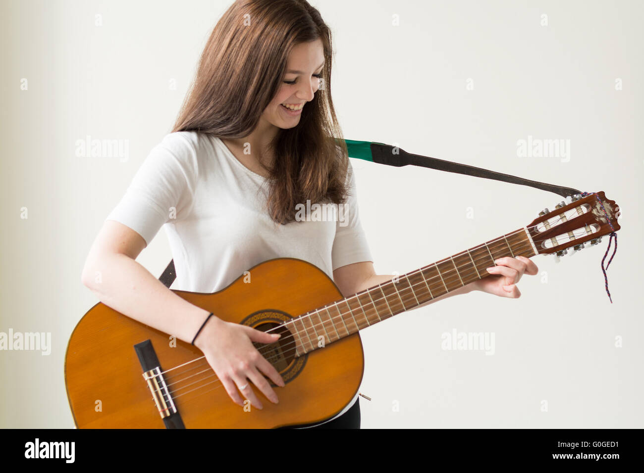 Playing musical instruments teenagers hi-res stock photography and ...