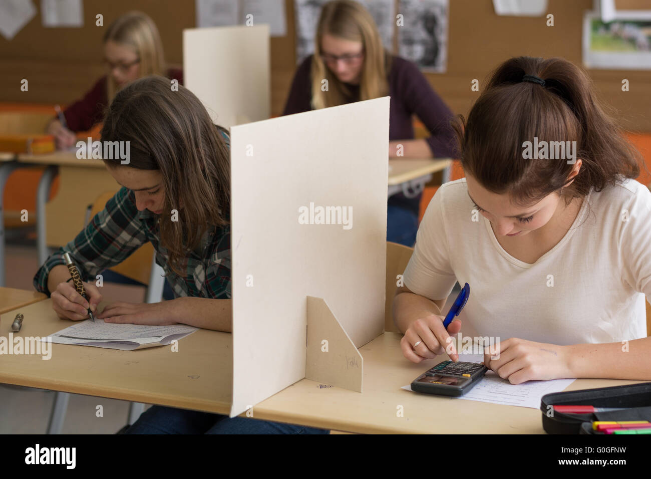 School girls examination classroom hi-res stock photography and images ...