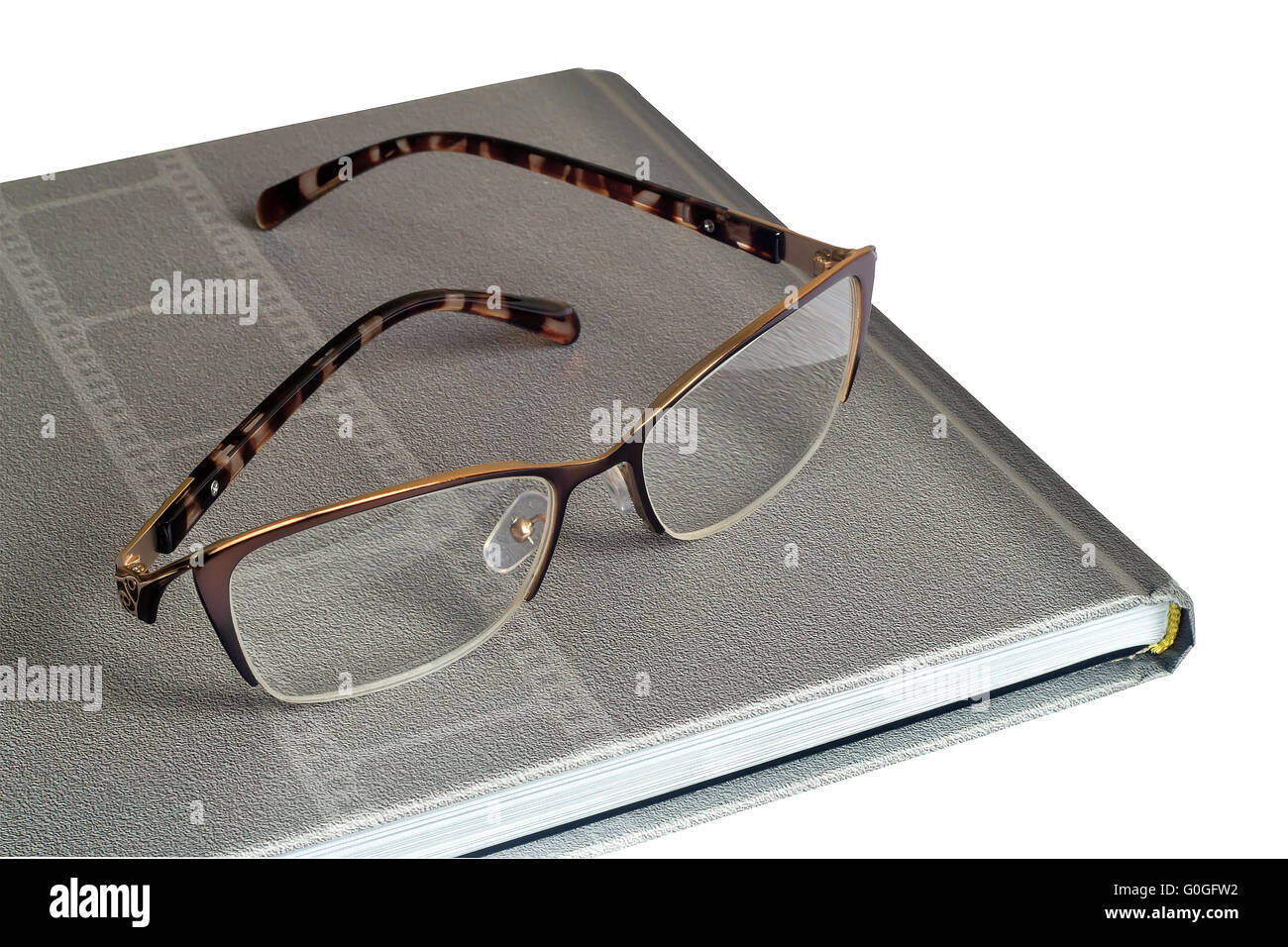 Glasses and notebook on a white background Stock Photo - Alamy