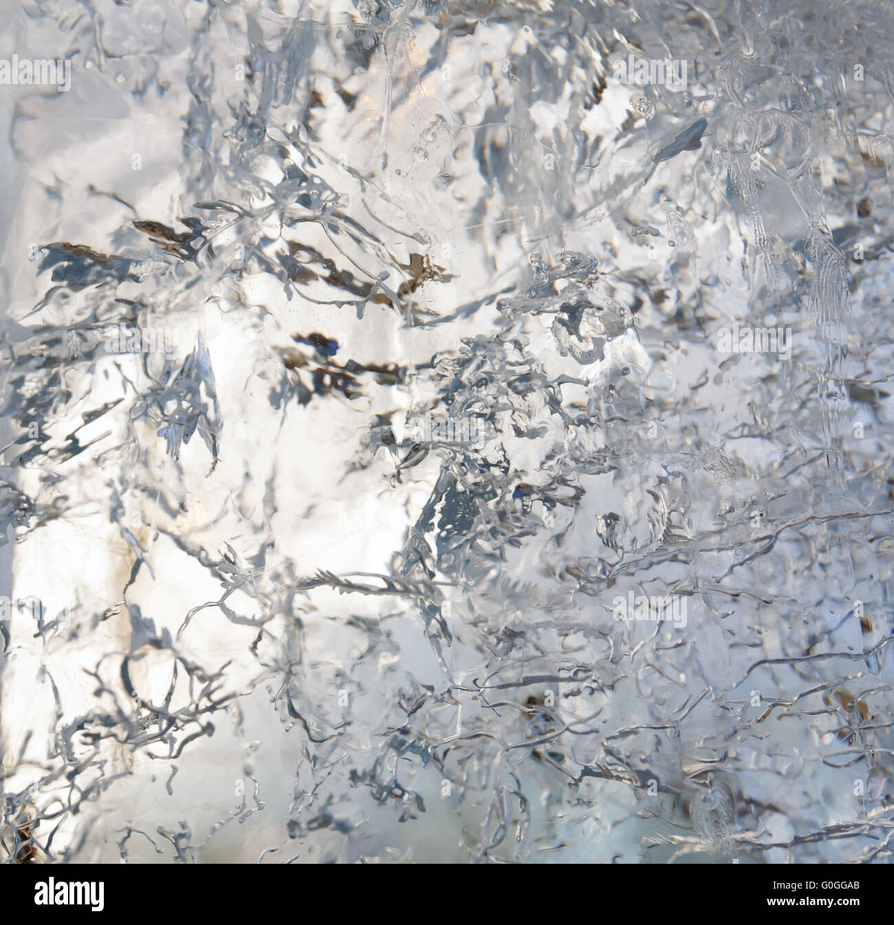 Glacial transparent block of ice with patterns Stock Photo - Alamy