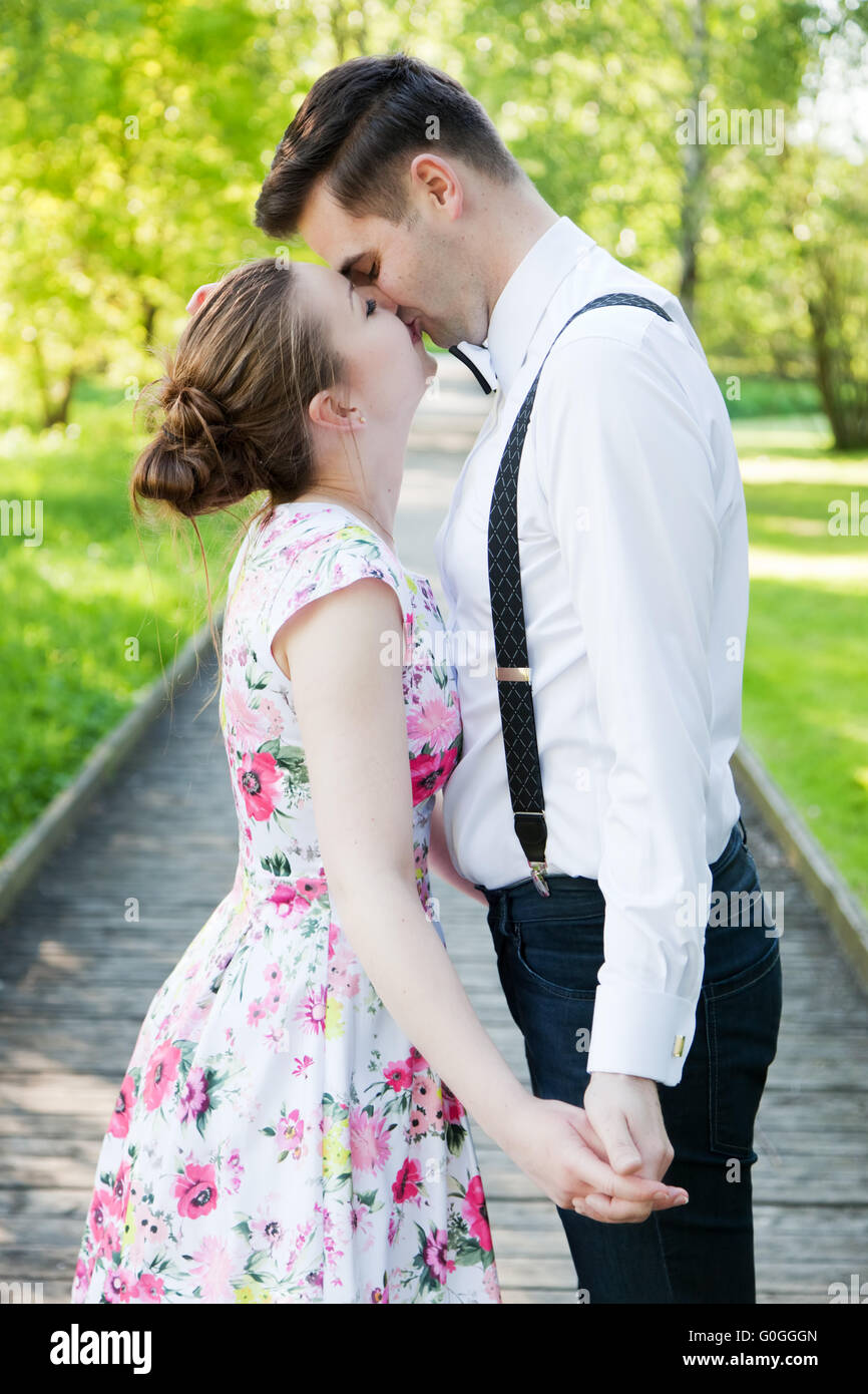 Young couple in love together, holding hands Stock Photo - Alamy