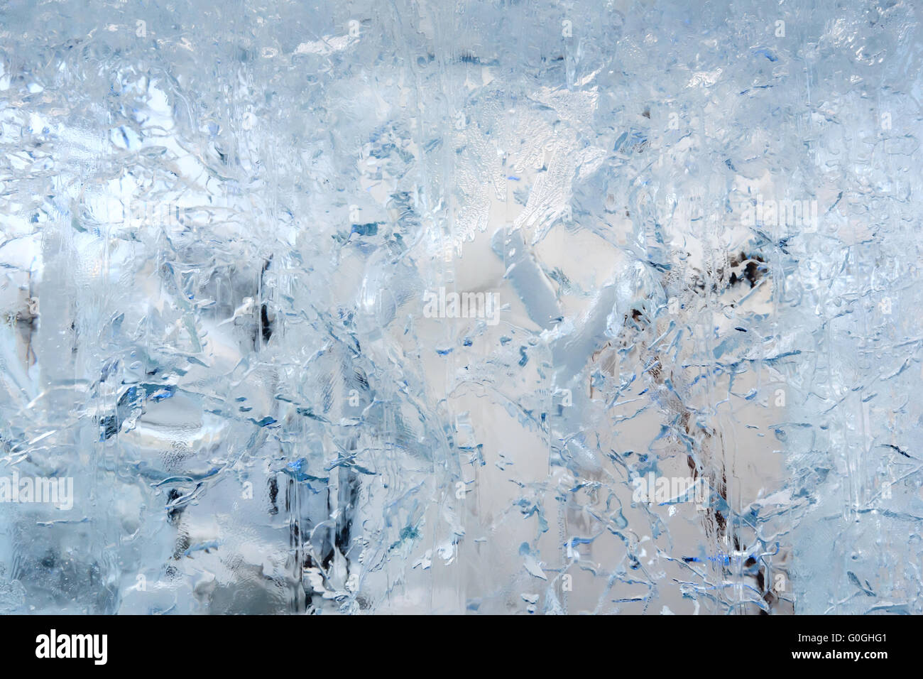 Glacial transparent block of ice with patterns Stock Photo - Alamy