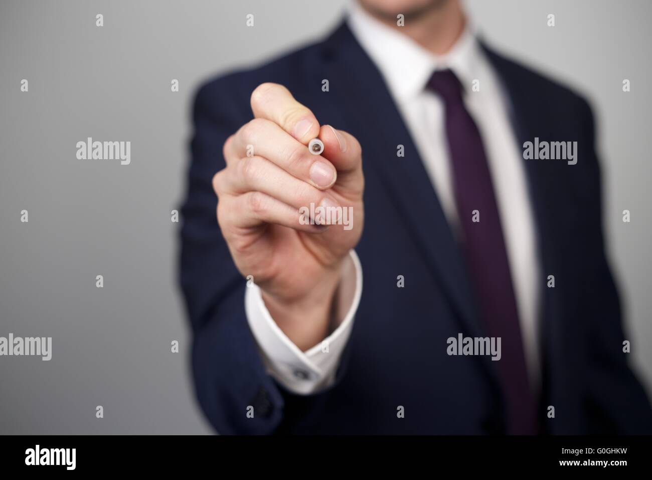 Business man writing on whiteboard Stock Photo - Alamy