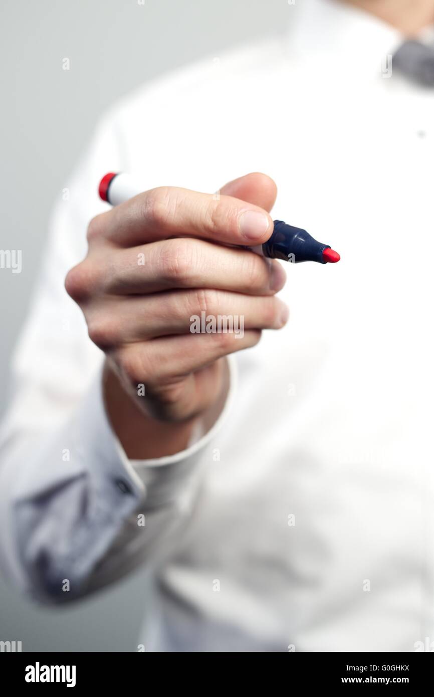 Business man writing on whiteboard Stock Photo - Alamy