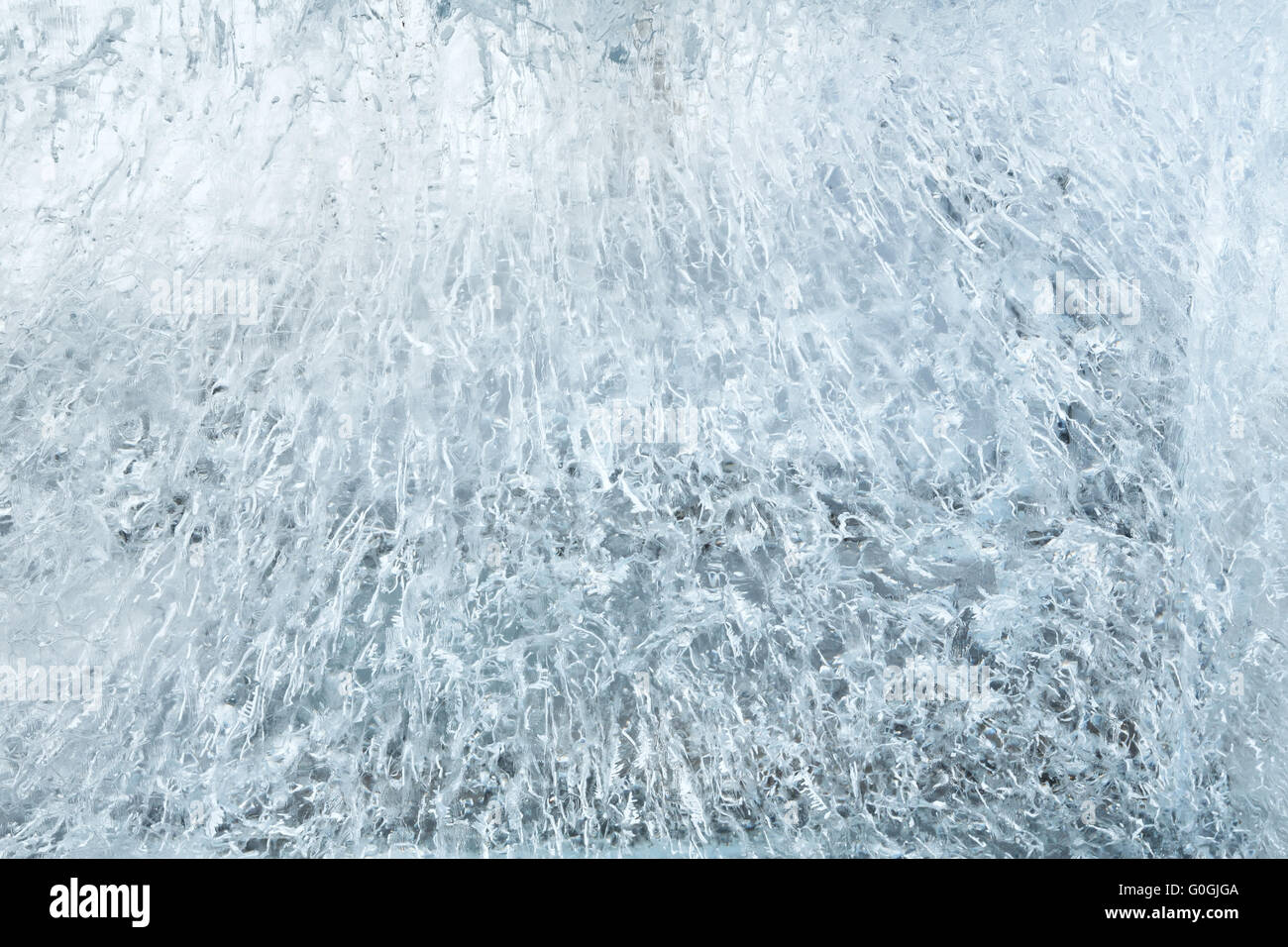 Glacial transparent wall of ice with patterns Stock Photo - Alamy