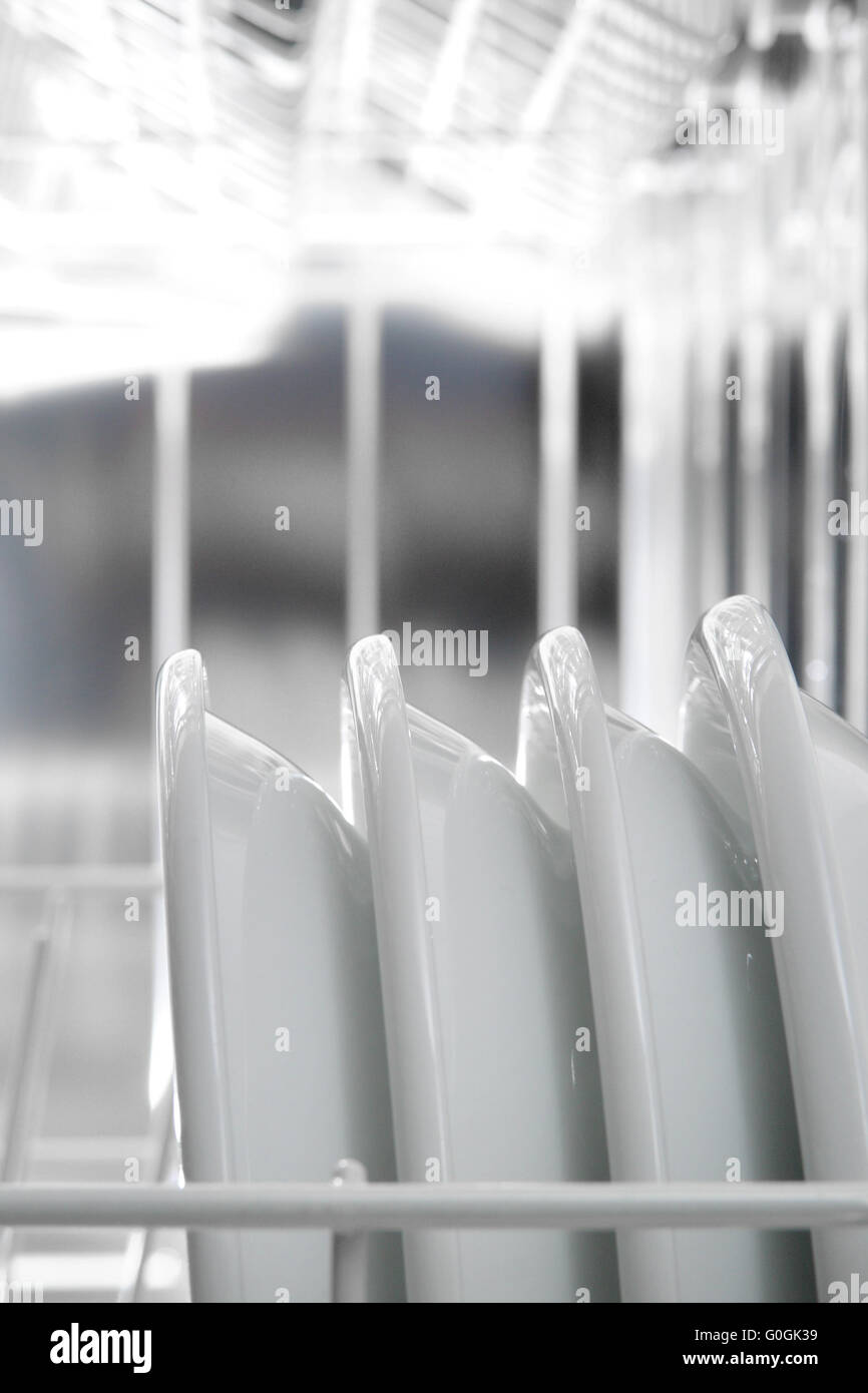 dishwasher with clean plates Stock Photo - Alamy