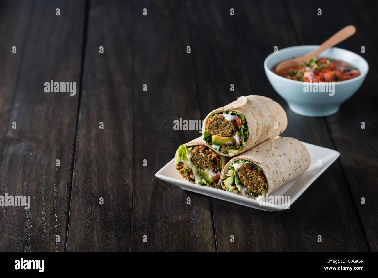Vegetarian falafel wraps with avocado and cheese Stock Photo - Alamy