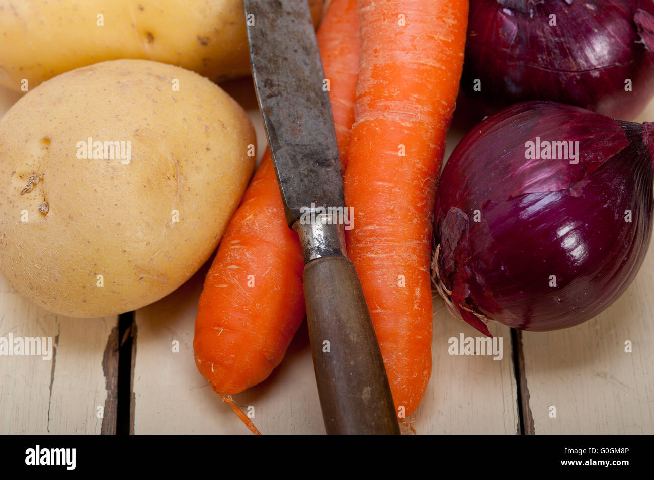 basic vegetable ingredients carrot potato onion Stock Photo - Alamy