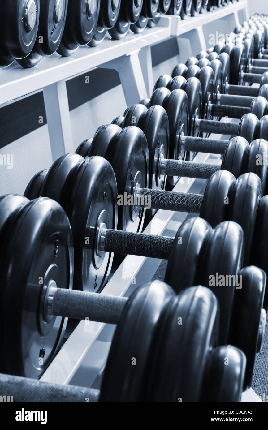 big dumbbell on a stand Stock Photo - Alamy