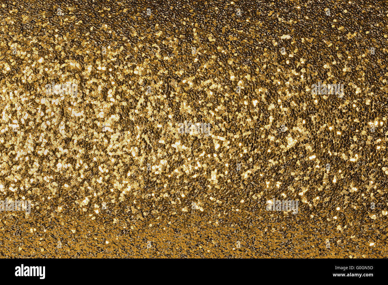 shiny gold background with sparkles closeup Stock Photo - Alamy
