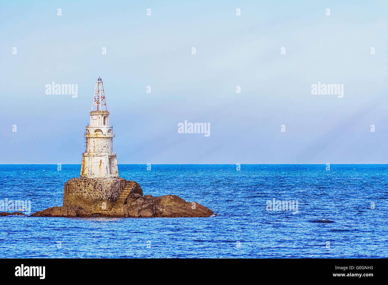 Beacon in the Sea Stock Photo - Alamy