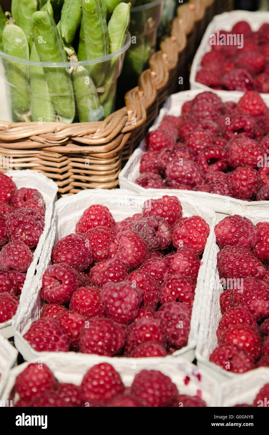 Ripe juicy raspberry in boxes hi-res stock photography and images - Alamy