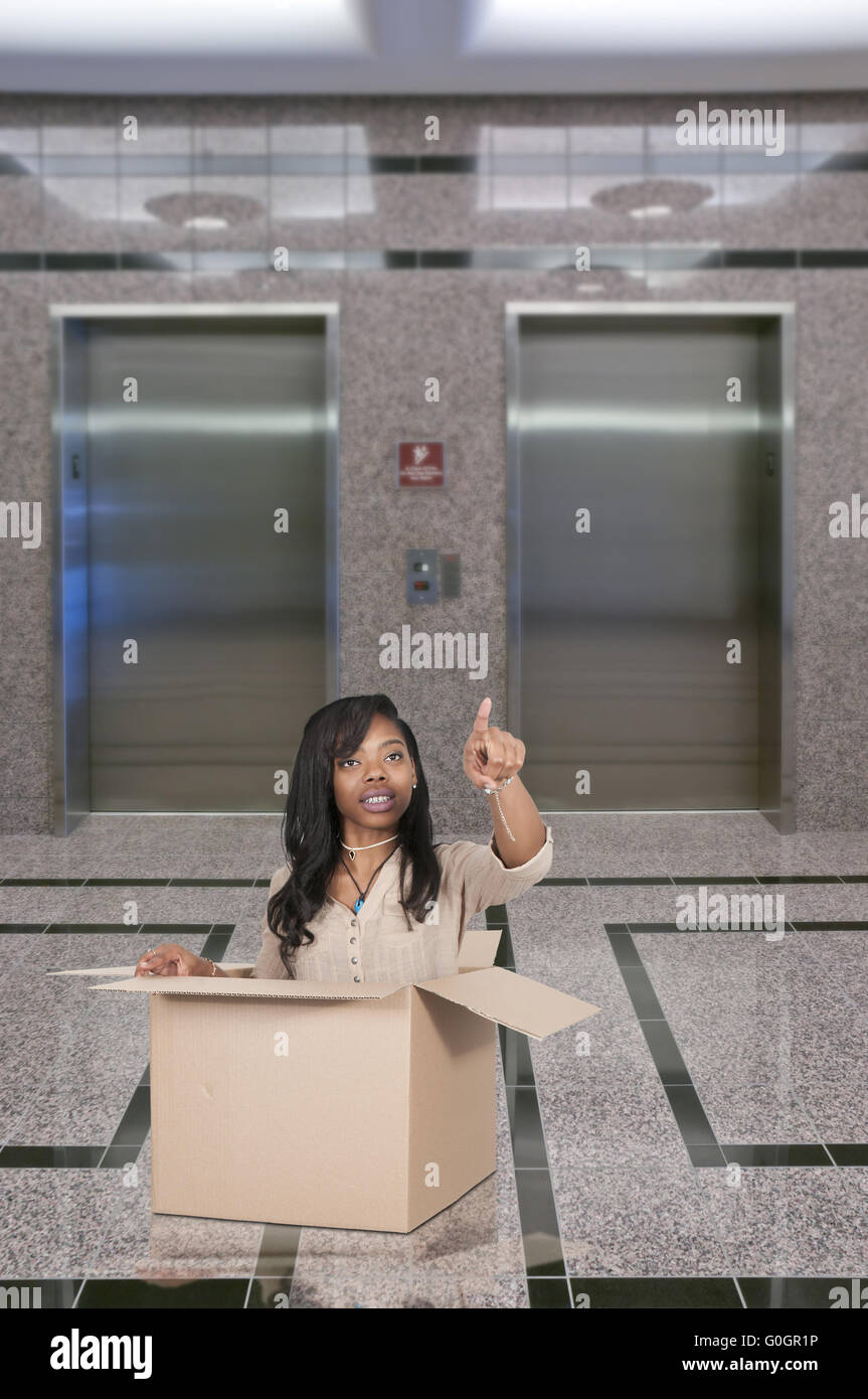 Woman In A Box Stock Photo - Alamy