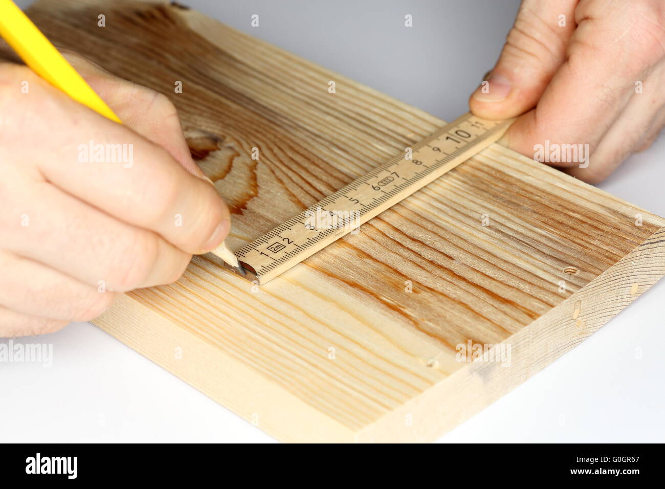 wood worker is marking Stock Photo - Alamy