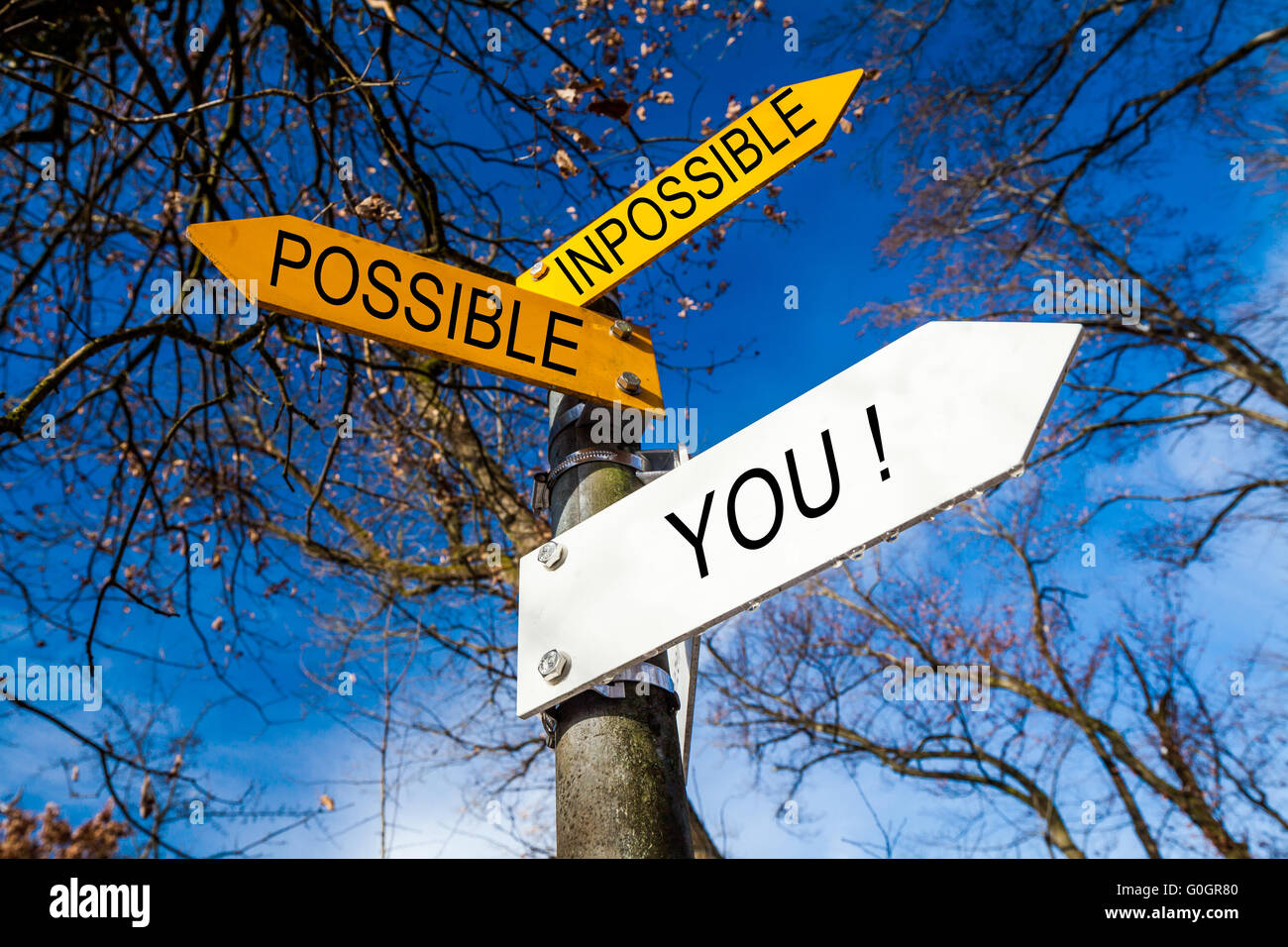 Decision sign in yellow and white Stock Photo - Alamy