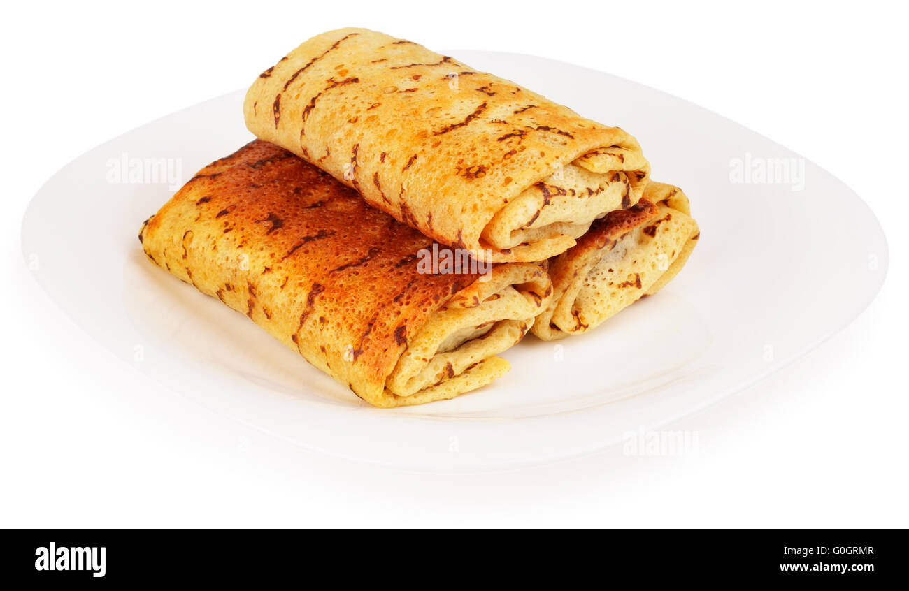 Stuffed pancakes (spring rolls) on plate over white background Stock ...