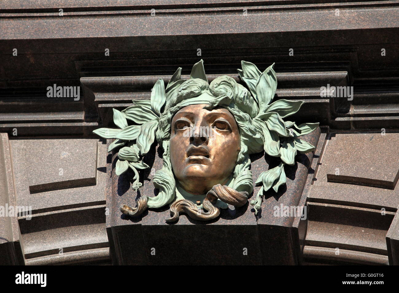 mascaron female head Stock Photo - Alamy