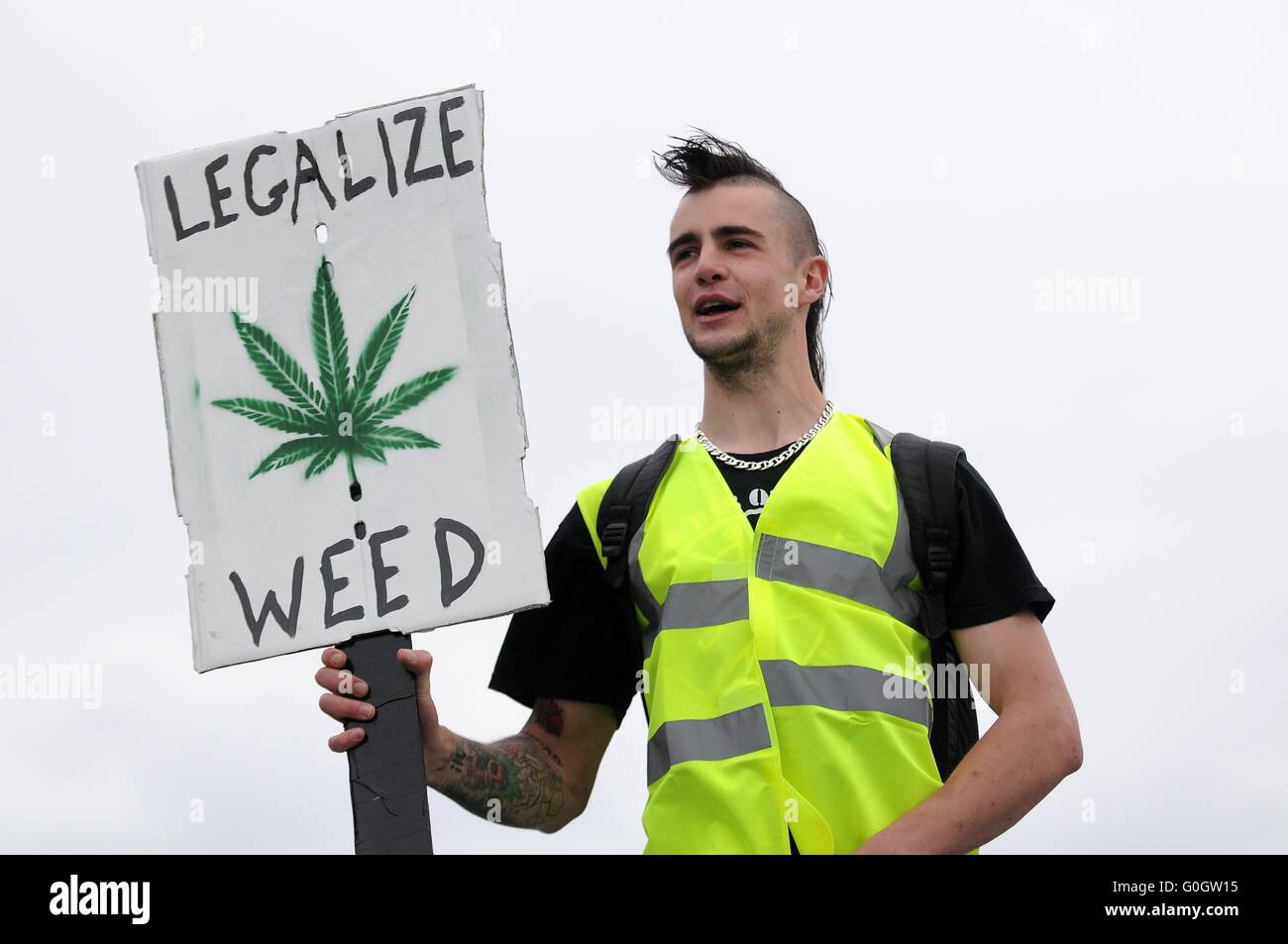 A legalise cannabis campaigner holds a sign up during a legalise weed ...