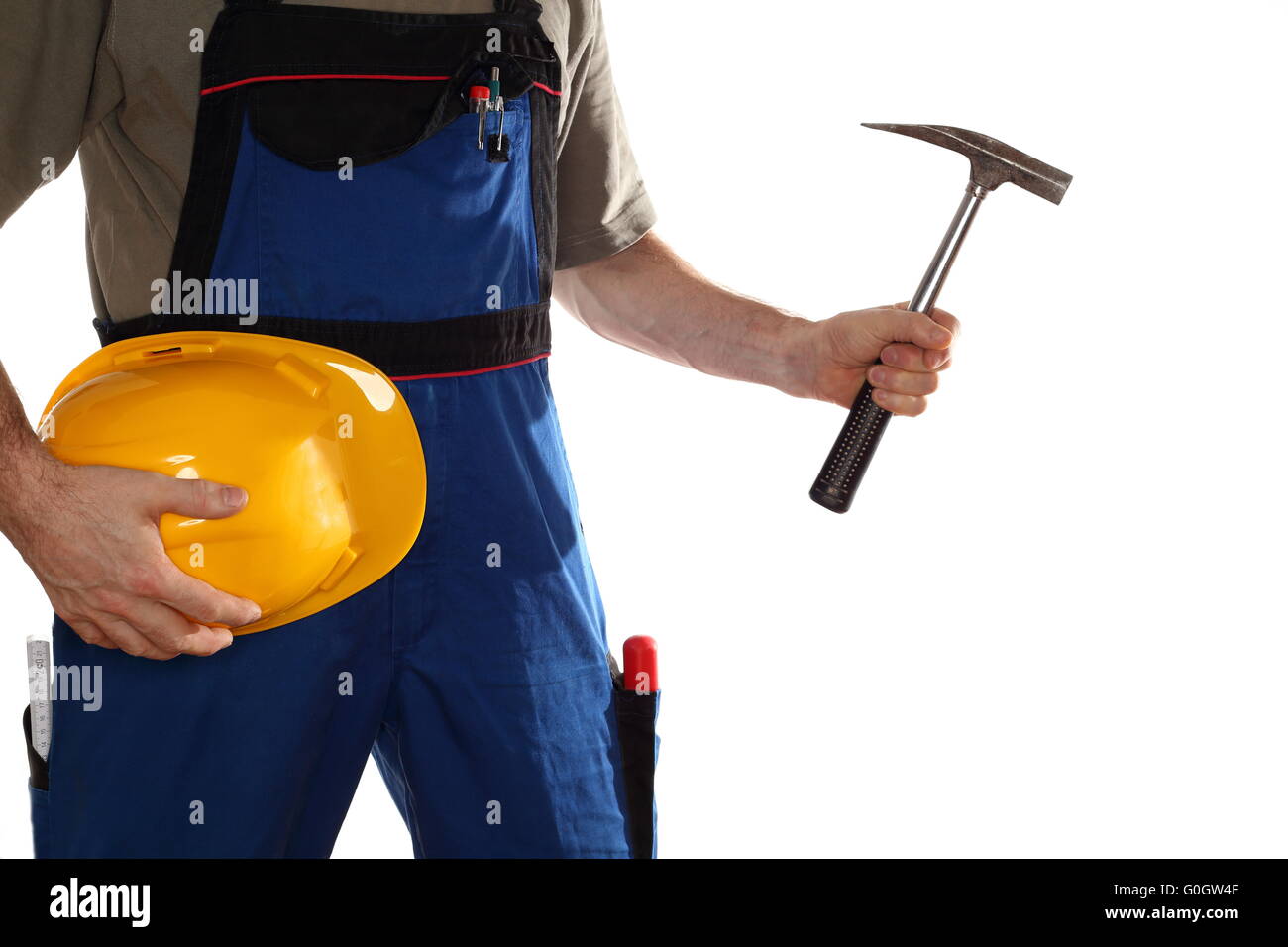 worker with yellow helmet and hamer Stock Photo - Alamy
