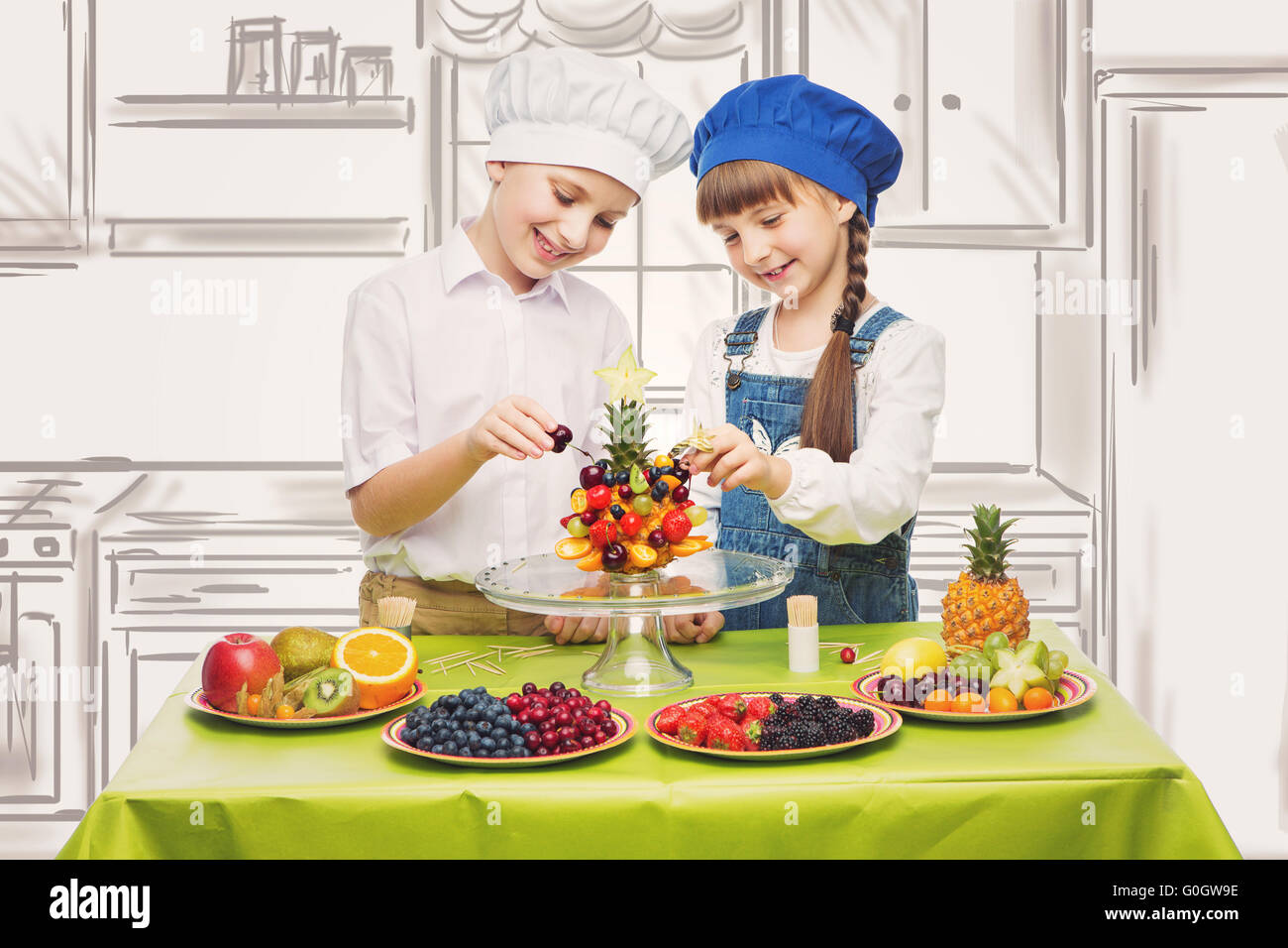 Children making fruit snacks Stock Photo - Alamy