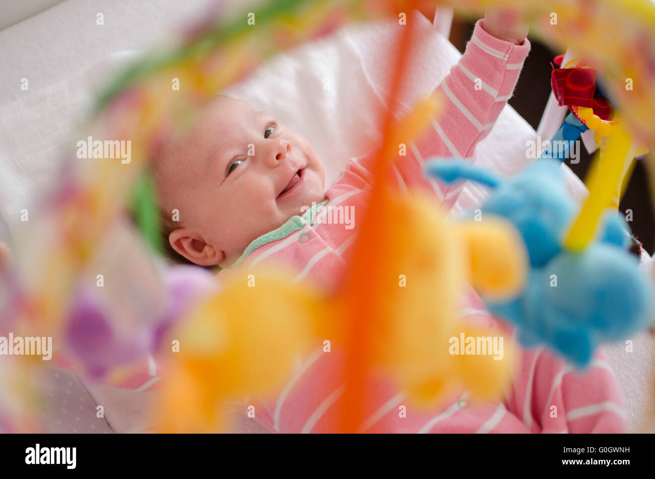 baby in a cot Stock Photo - Alamy