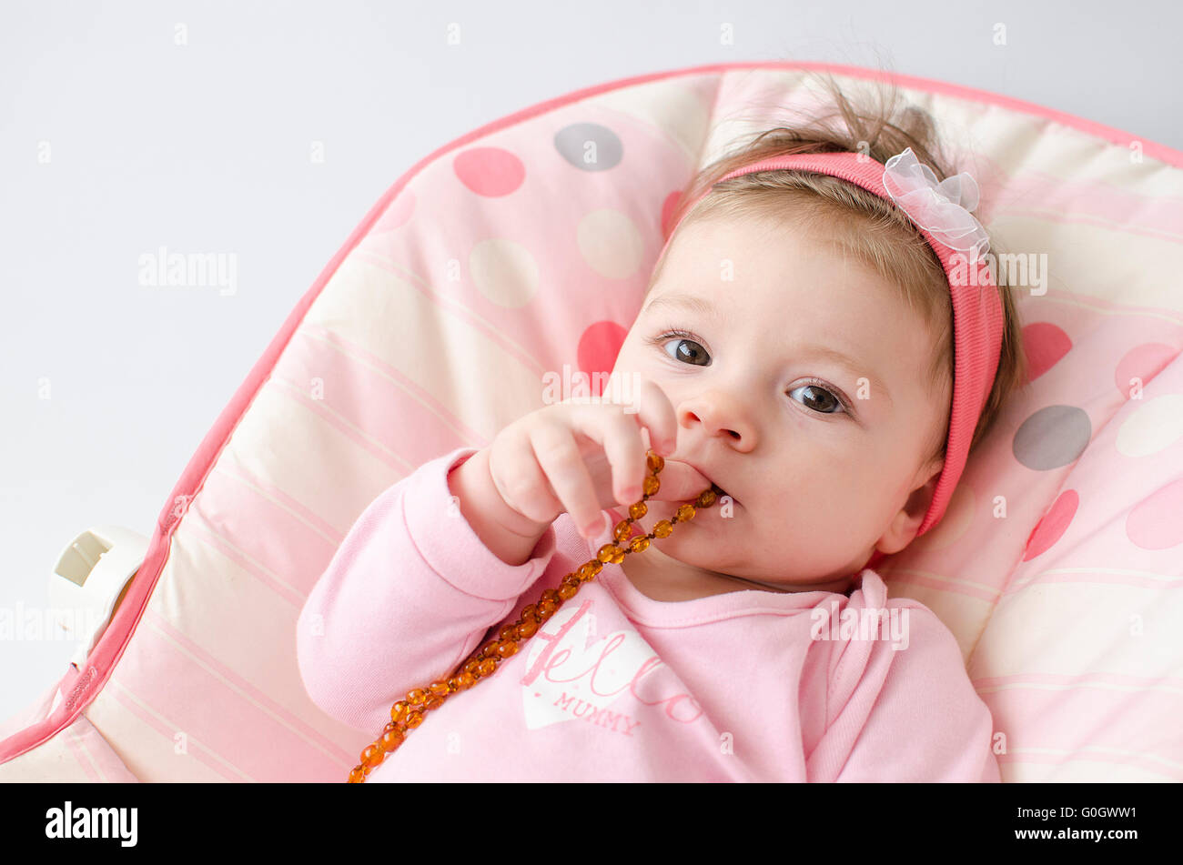 teething baby girl Stock Photo - Alamy