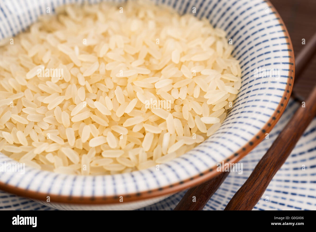 bowl of parboiled risotto rice Stock Photo - Alamy