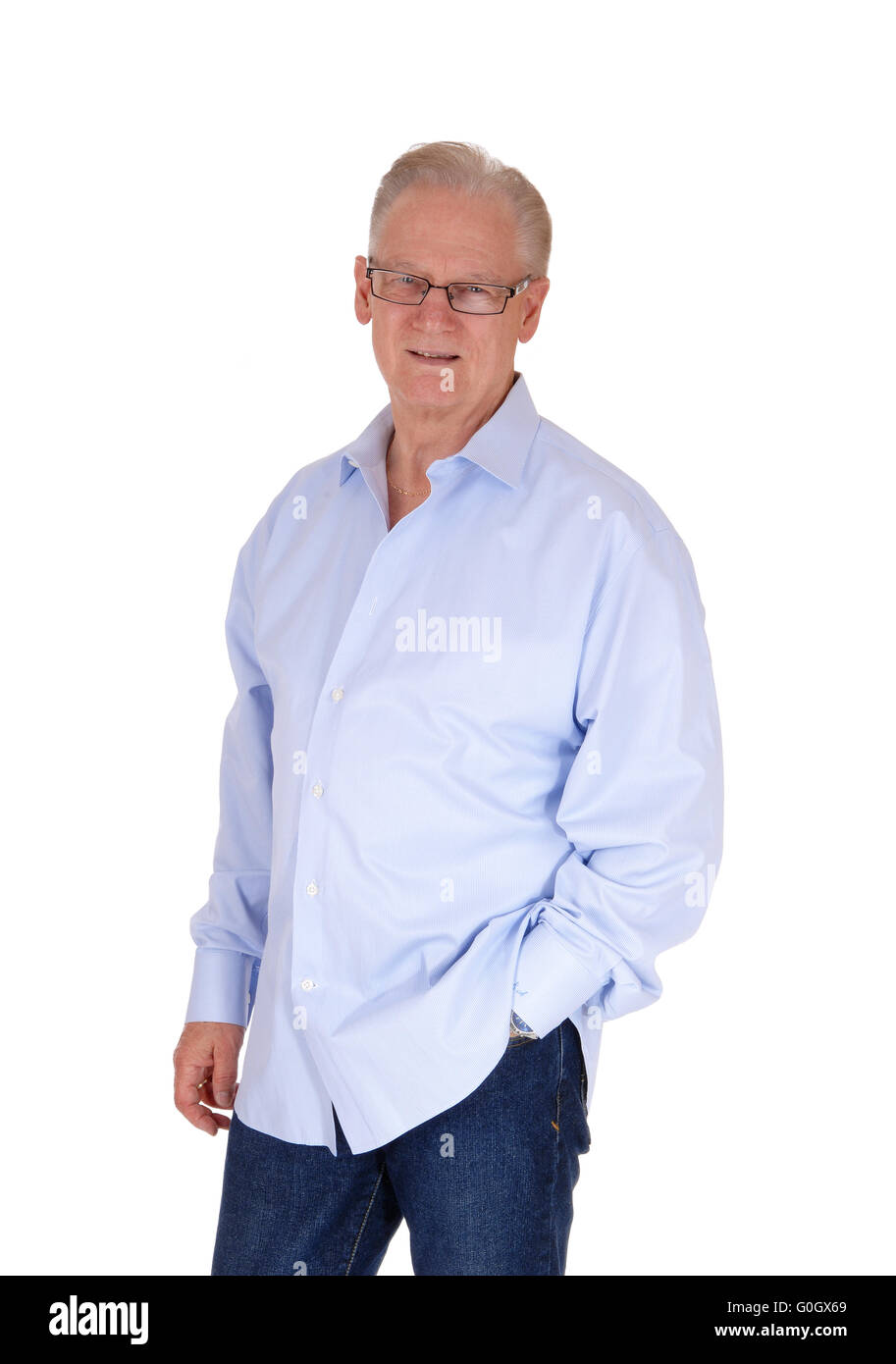 Handsome senior man in blue shirt Stock Photo - Alamy