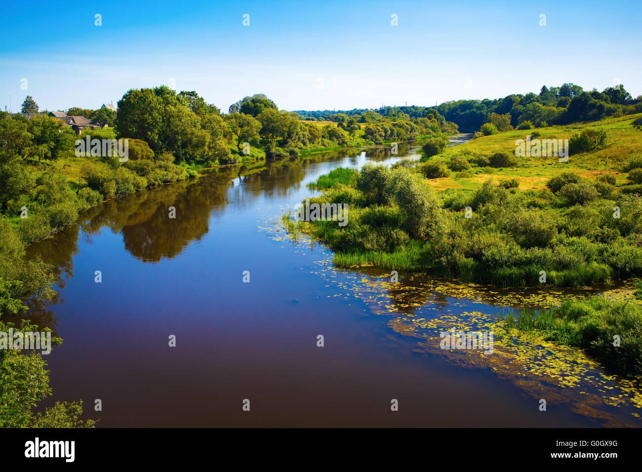 Landscape with a river Stock Photo - Alamy