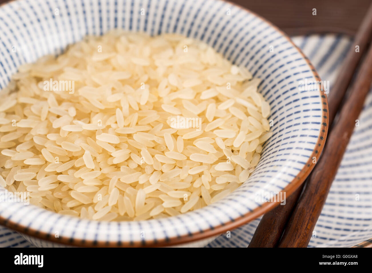 bowl of parboiled risotto rice Stock Photo - Alamy
