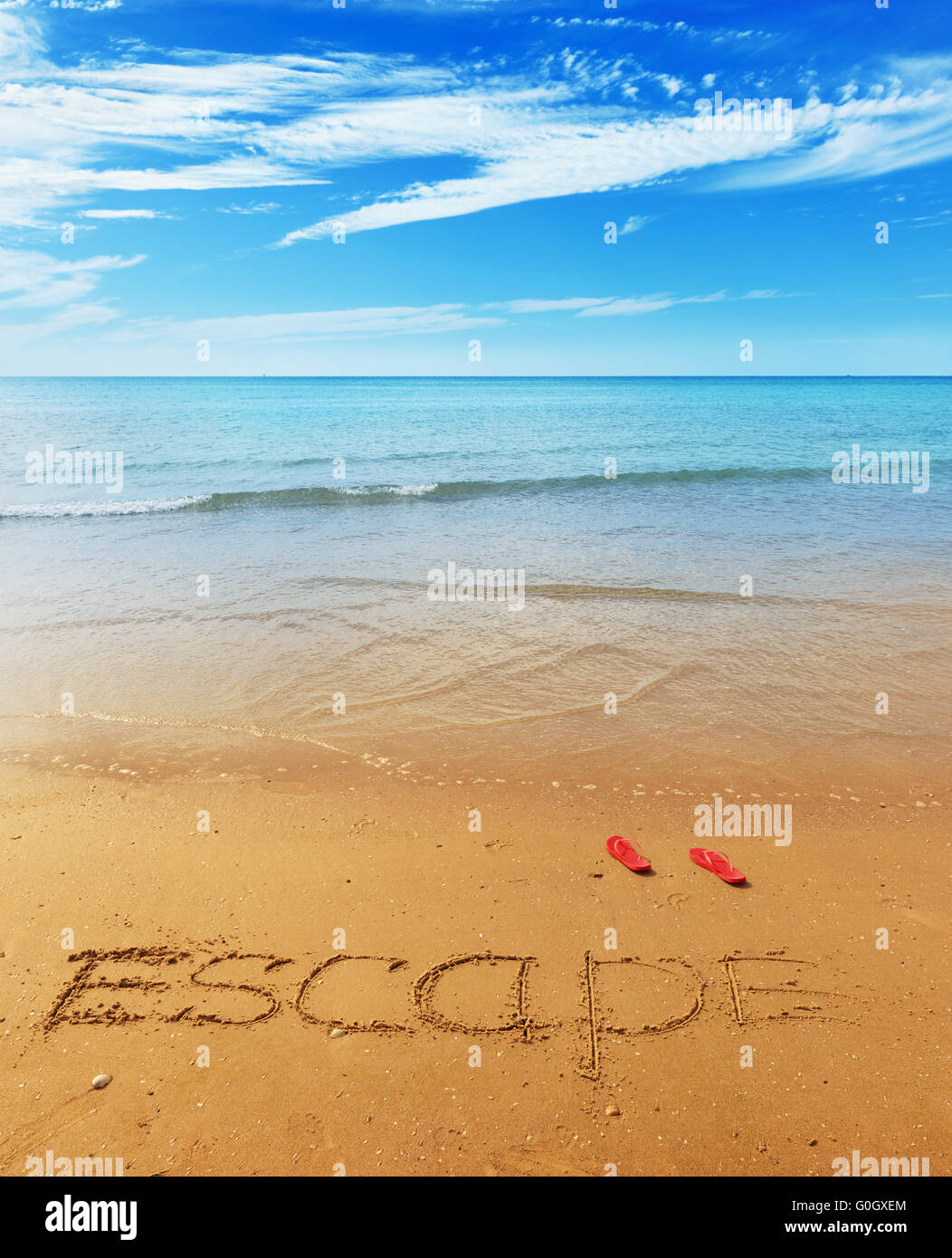 Escape message on the sand Stock Photo - Alamy