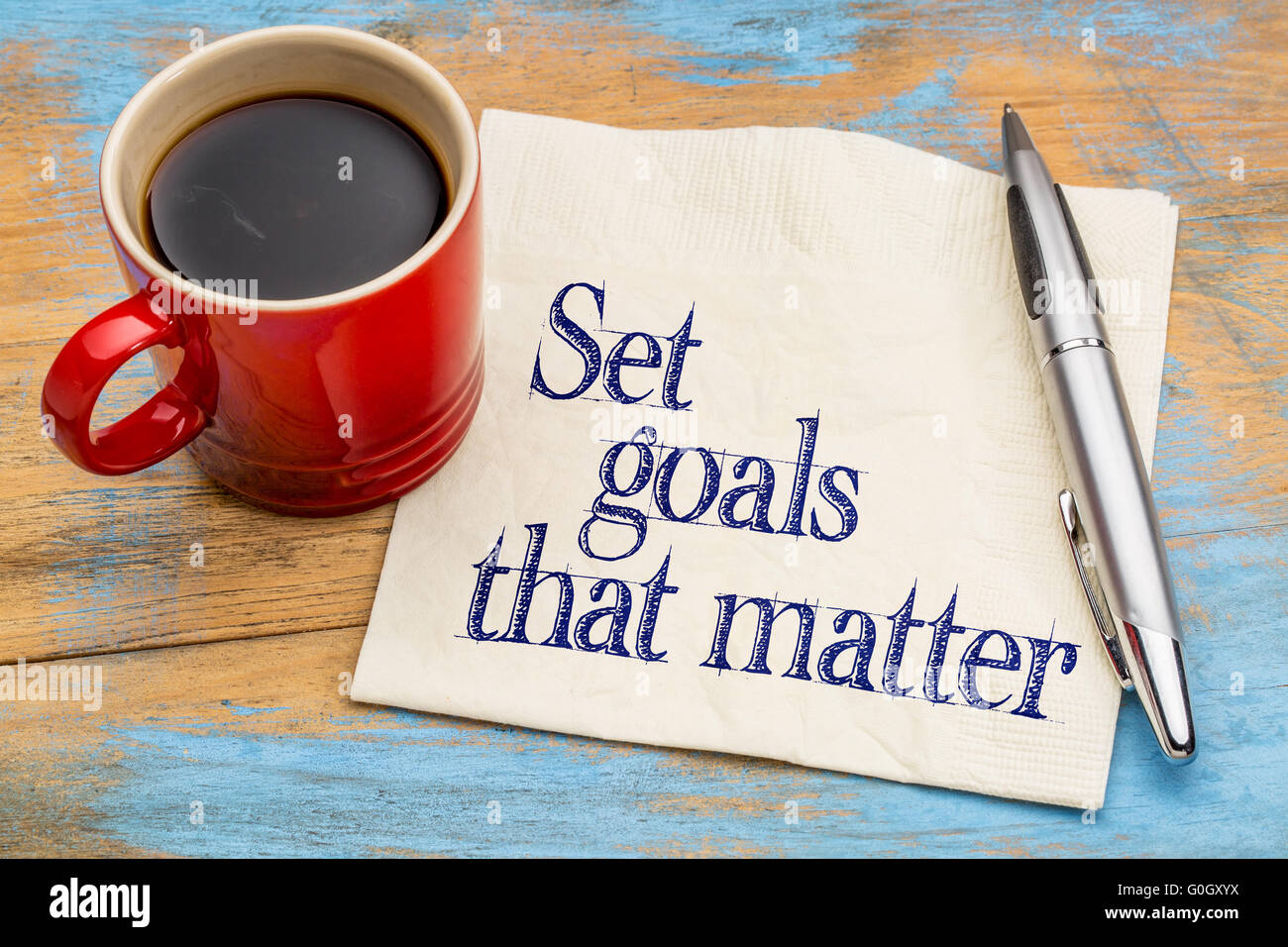 Set goals that matter advice or reminder - handwriting on a napkin with ...