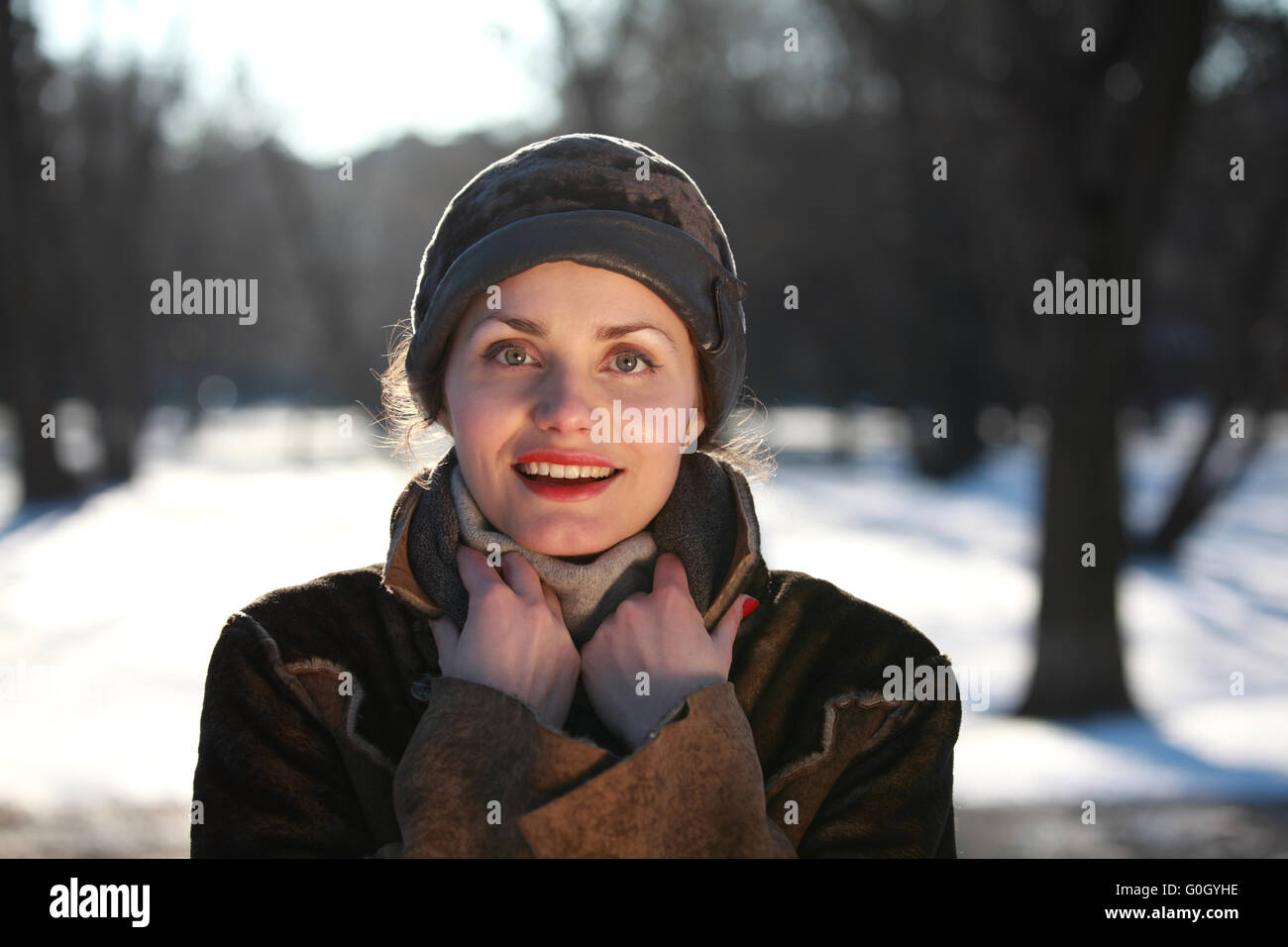Beautiful girl wearing cap and a buckskin jacket in winter time Stock ...