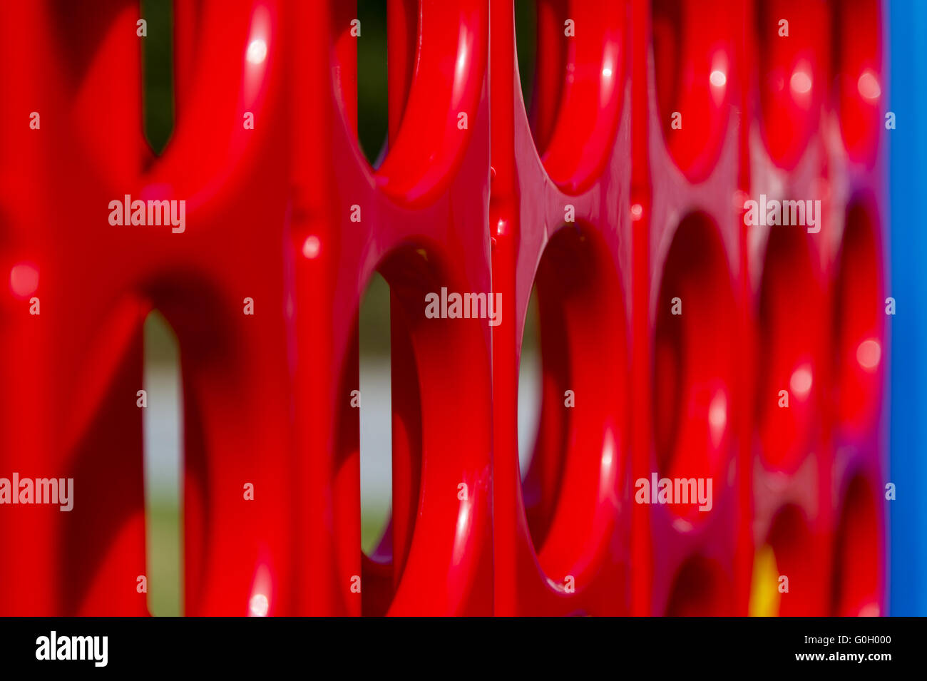 Red Climber plastic in a playground Stock Photo - Alamy