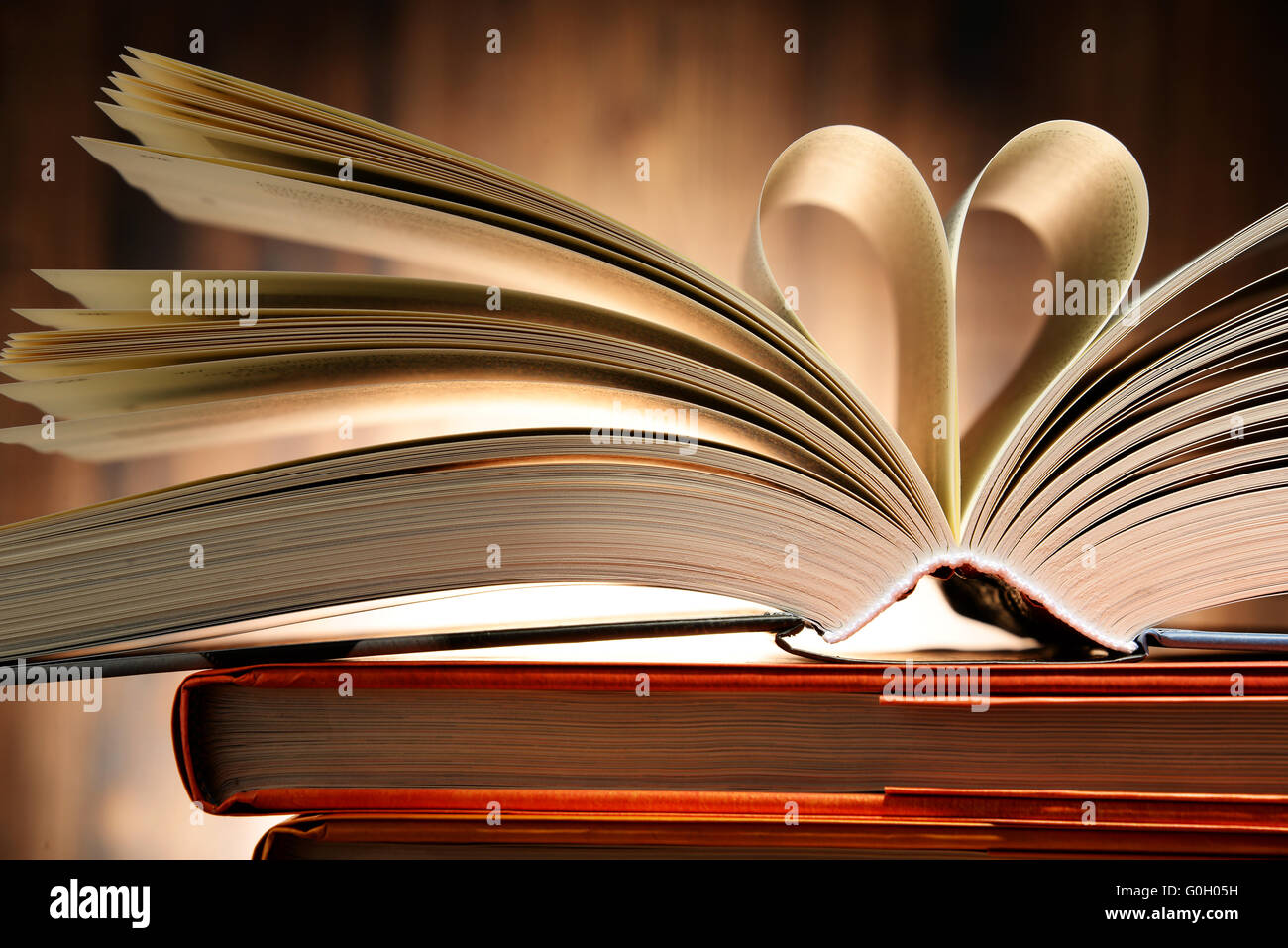 Hardcover book with two pages formed in the shape of heart Stock Photo ...