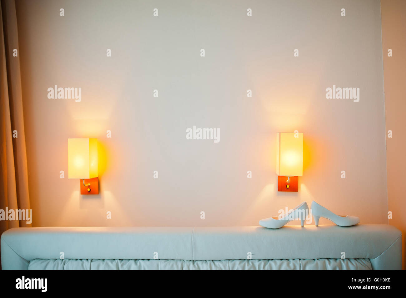 white wedding shoes near lamp Stock Photo - Alamy