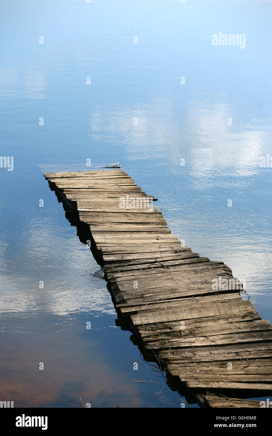 Wooden bridge clouds sky hi-res stock photography and images - Alamy