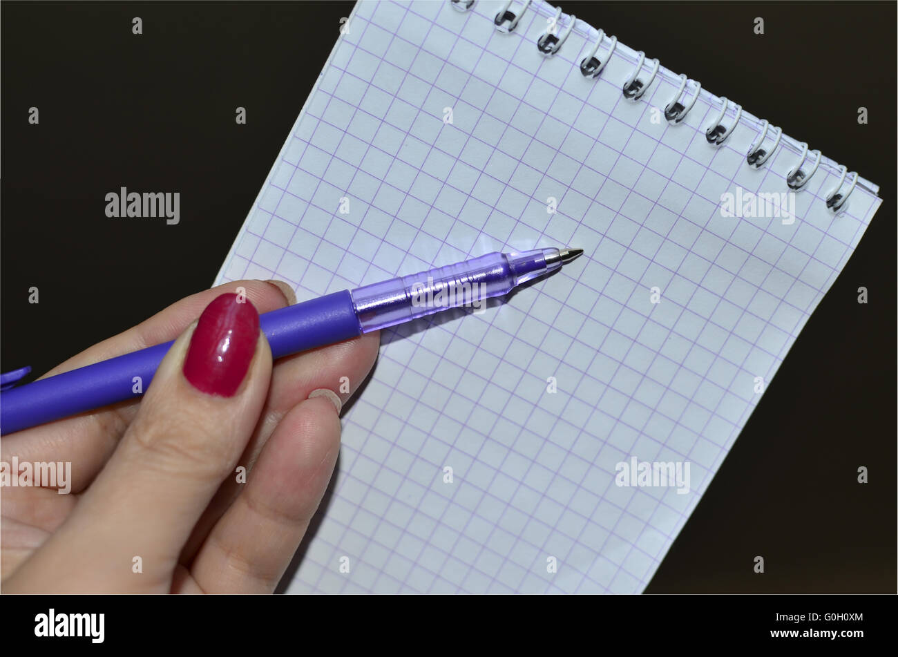 notebook with the handle on a black background Stock Photo - Alamy