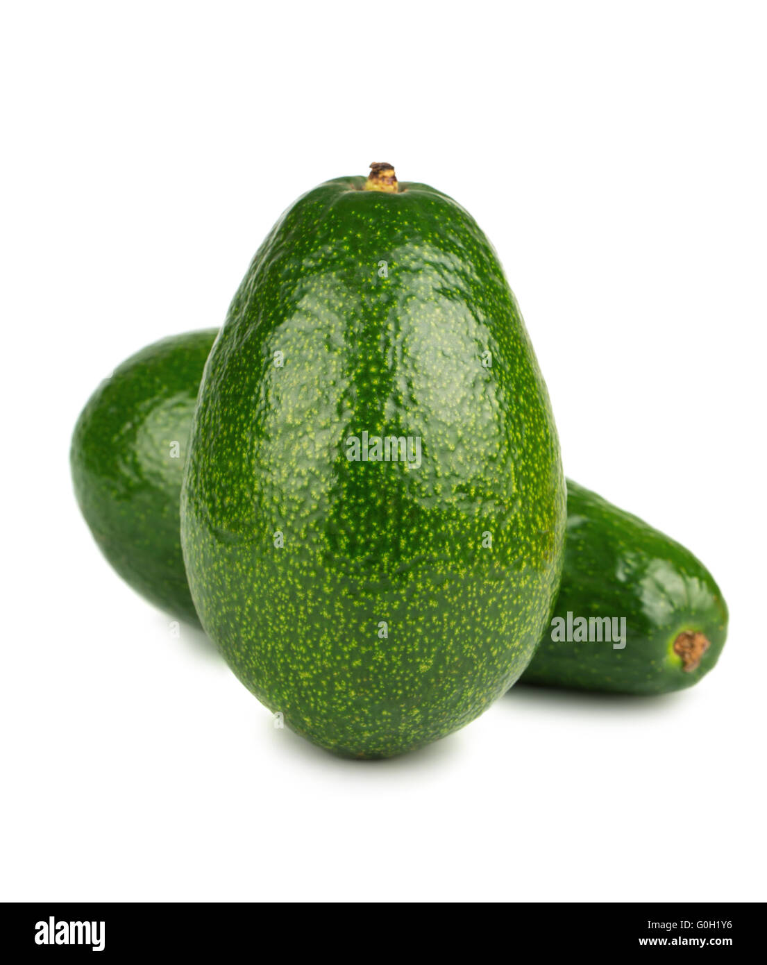 Two green avocado Stock Photo - Alamy