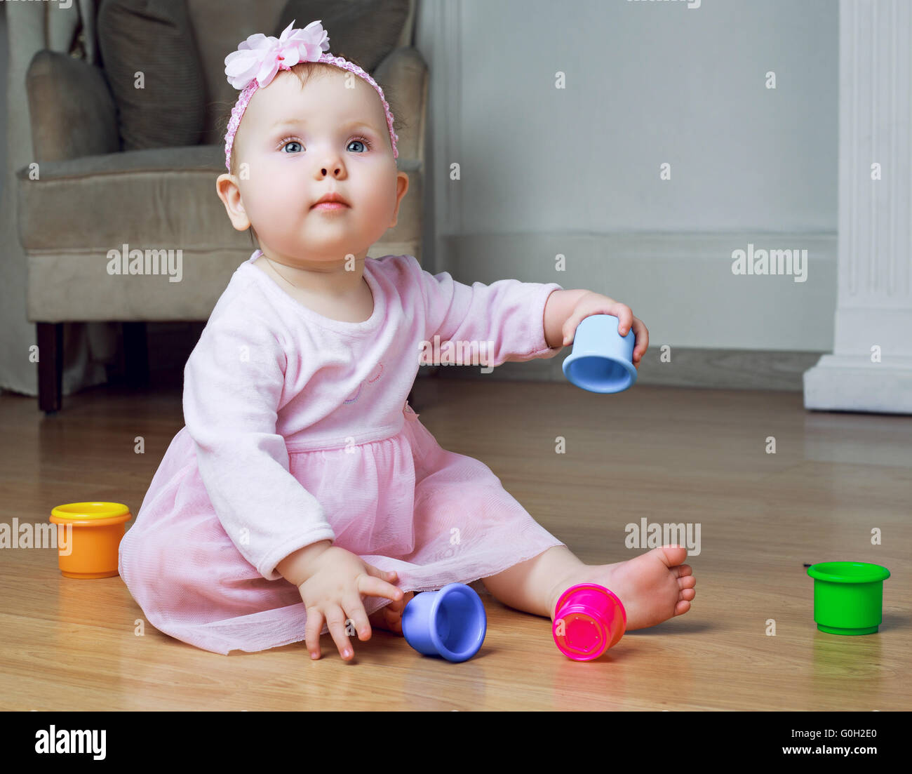 Cute baby playing toy pyramid hi-res stock photography and images - Alamy