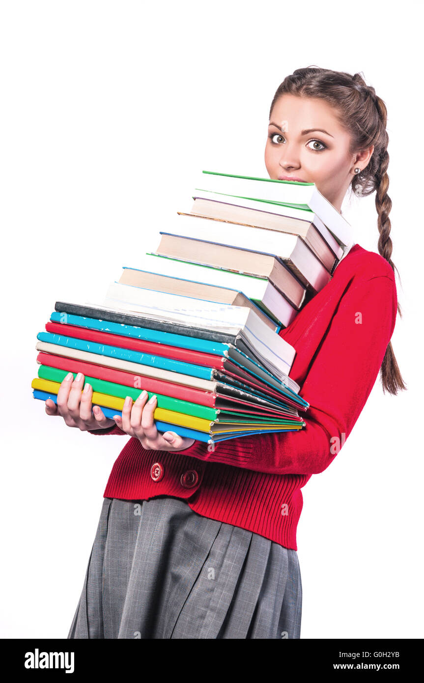 girl standing with a bunch of books Stock Photo - Alamy