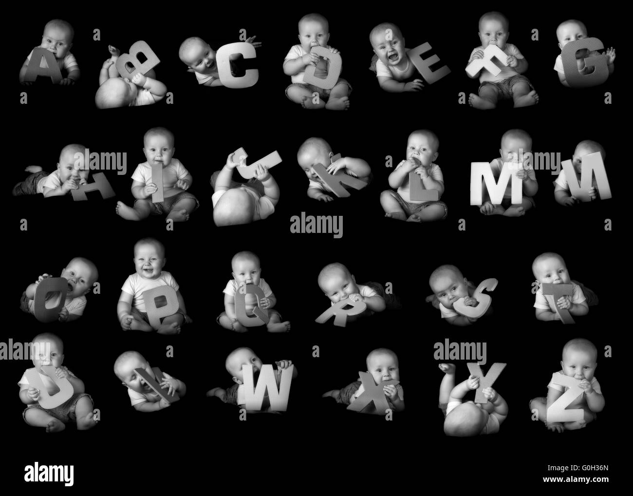Baby posing alphabet letters Stock Photo - Alamy