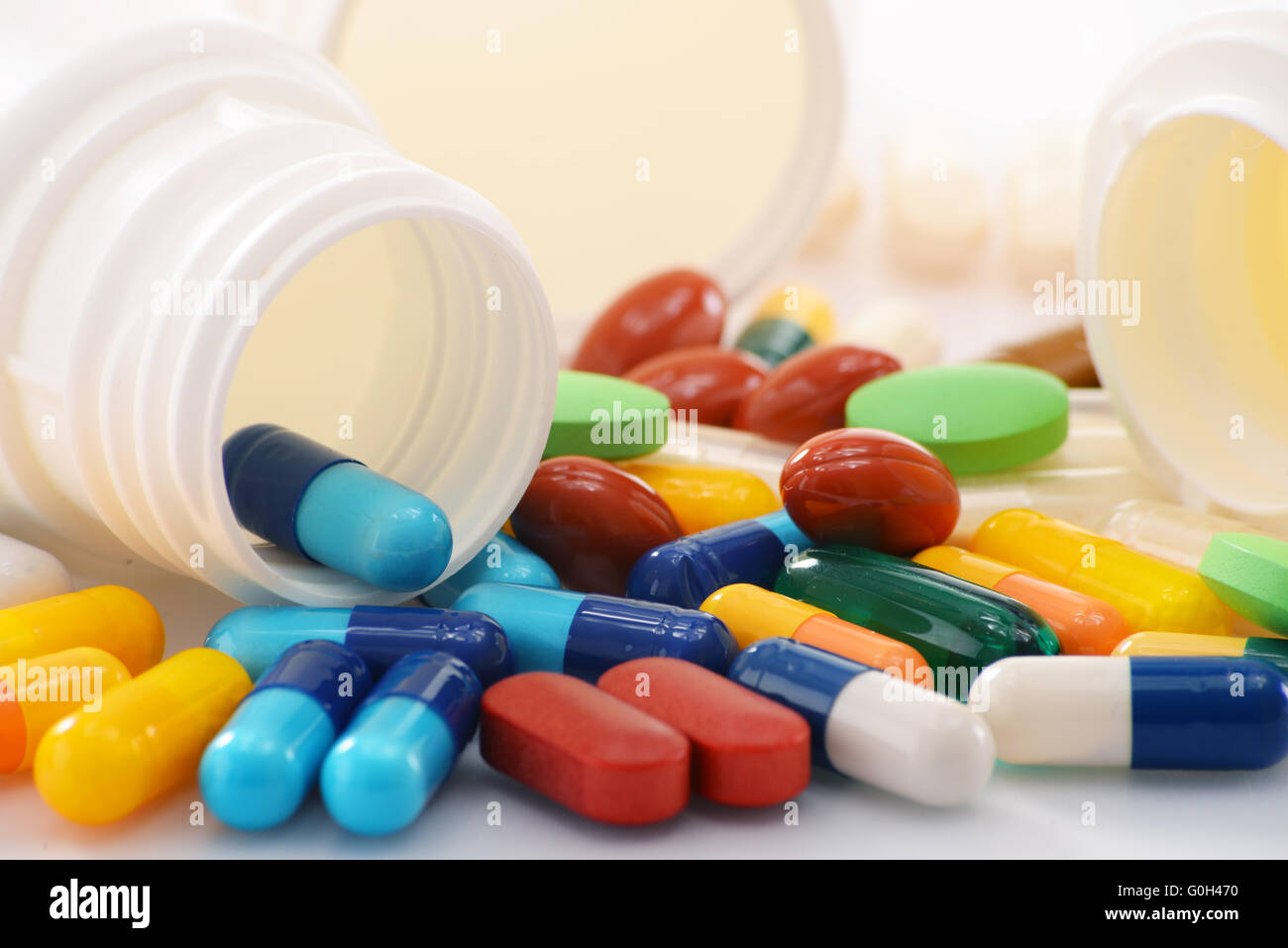 Composition with variety of drug pills and container Stock Photo - Alamy