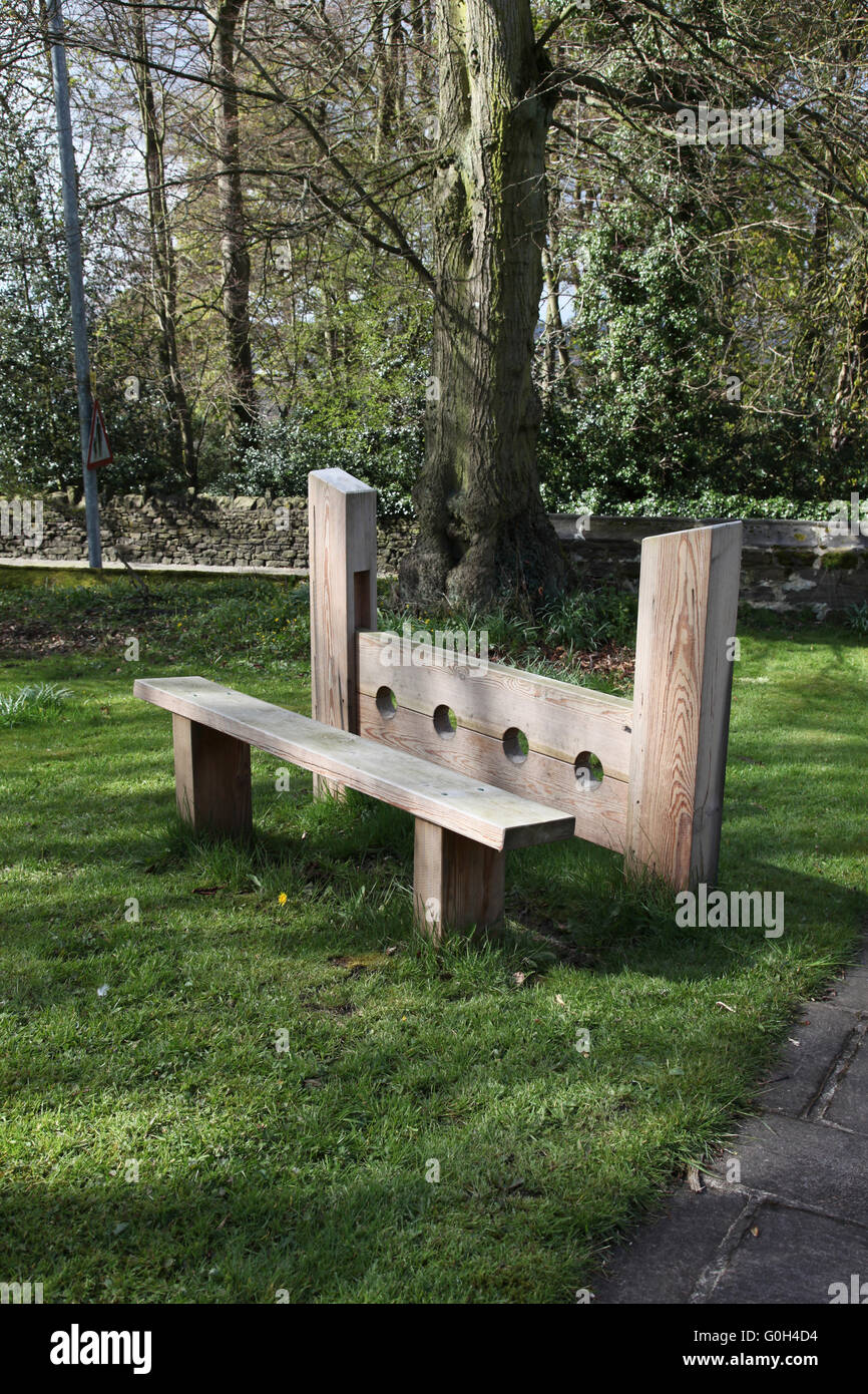 Wooden Stocks at St Peters Church, Rawdon, Leeds Stock Photo - Alamy