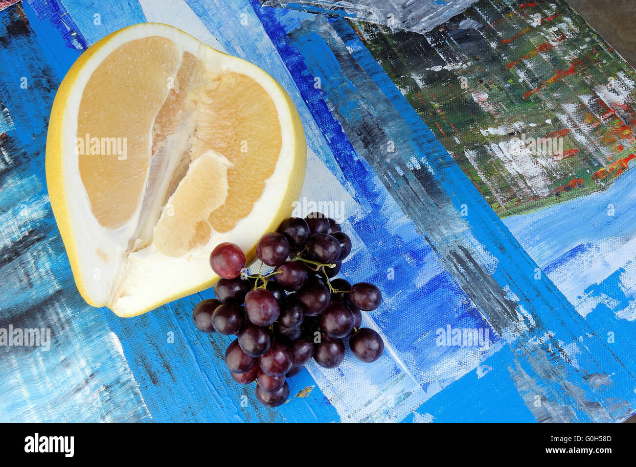 Honey pomelo (Citrus maxima, Citrus grandis) with red grapes Stock ...