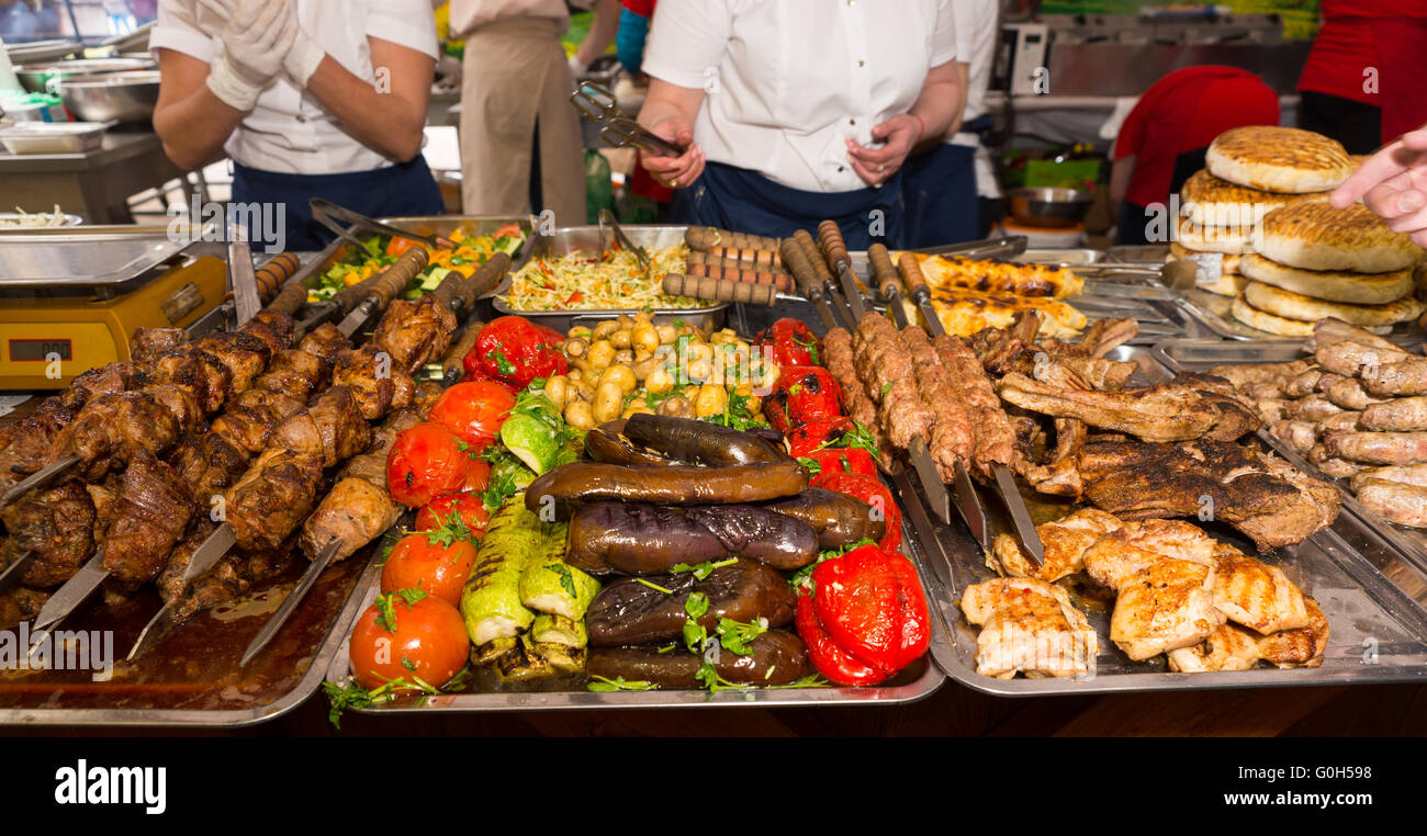 Close Up View of Bounty of Cooked Meats and Vegetables Arranged Neatly ...